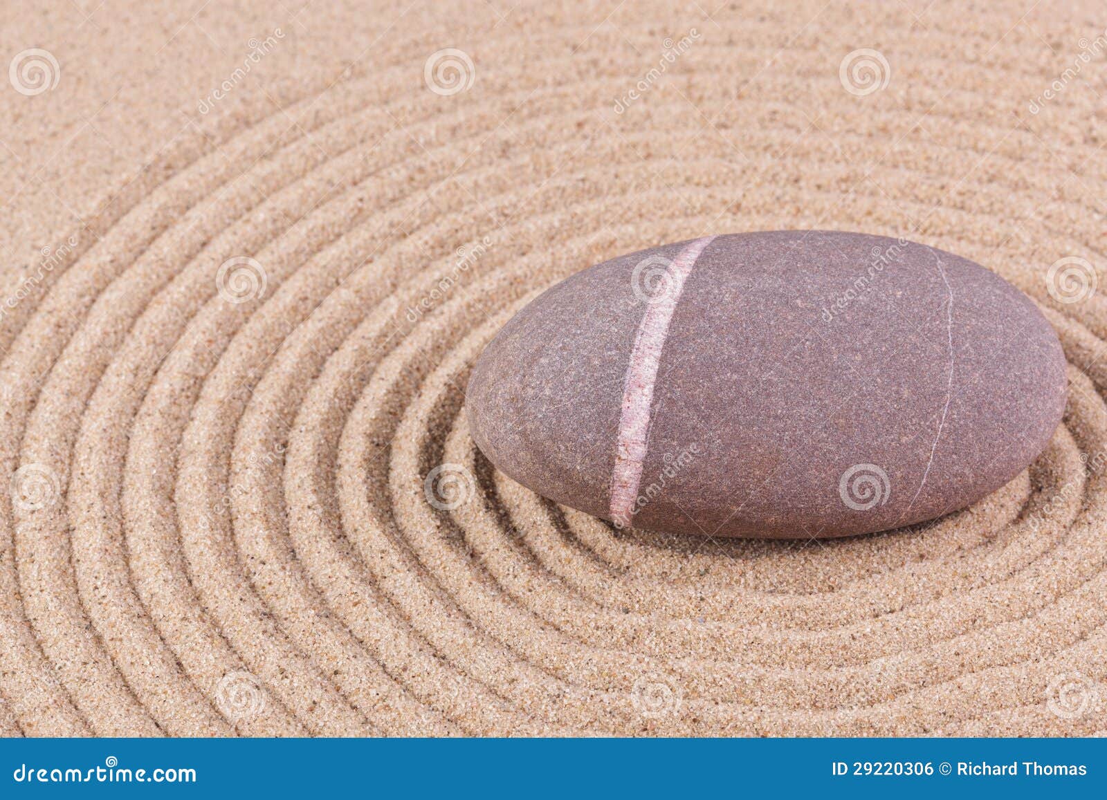 Pebble in a Raked Sand Circle Stock Photo - Image of garden, nature ...