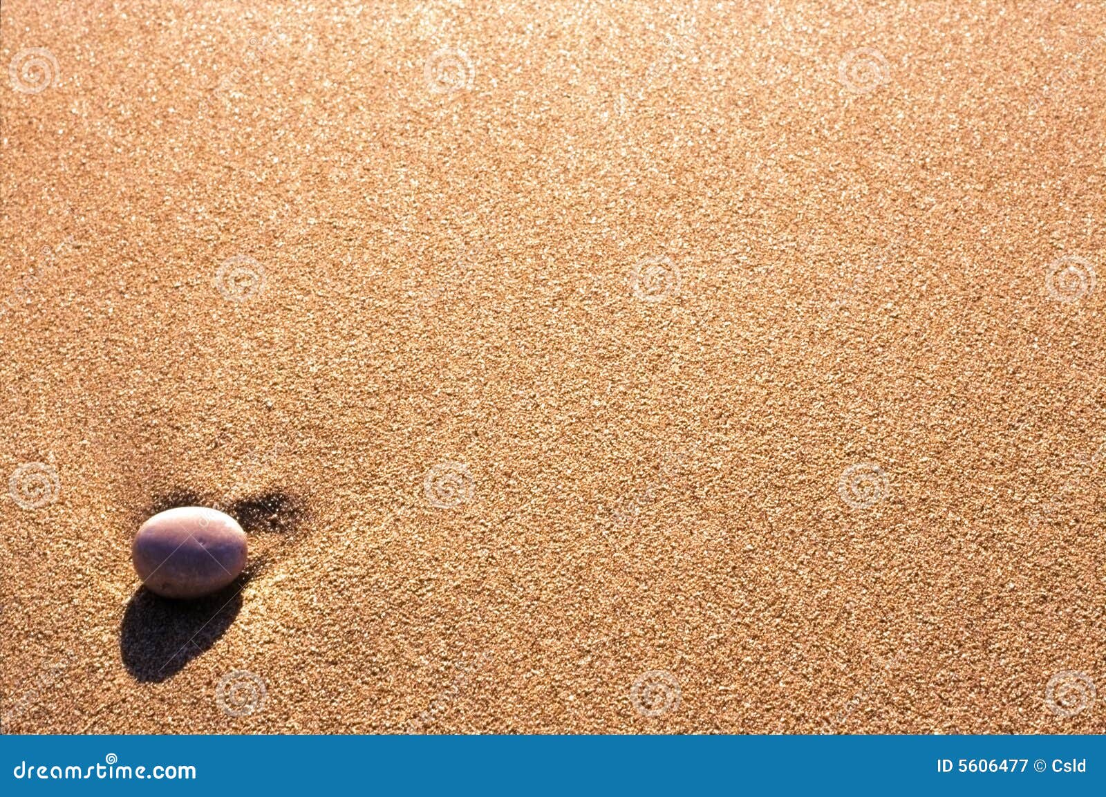 Pebble on the sand stock image. Image of smooth, nature - 5606477