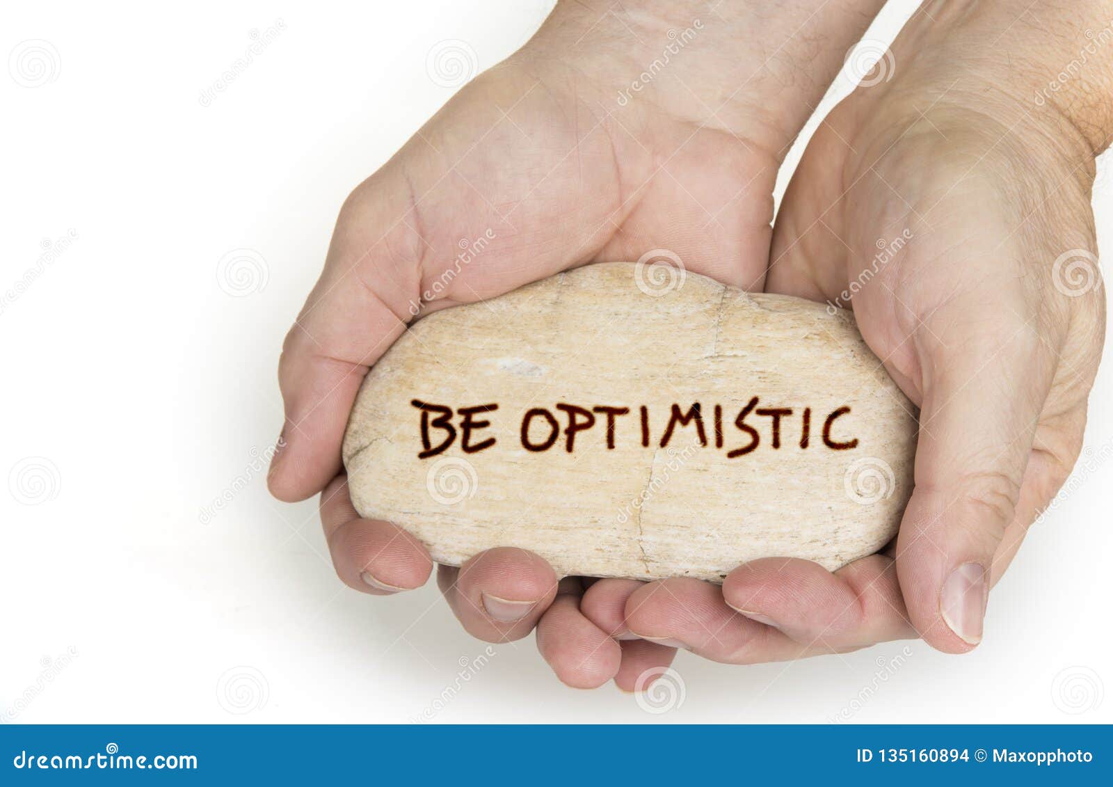 Pebble Stone in Hands. Concept for a Be Optimistic Sign Stock Photo ...