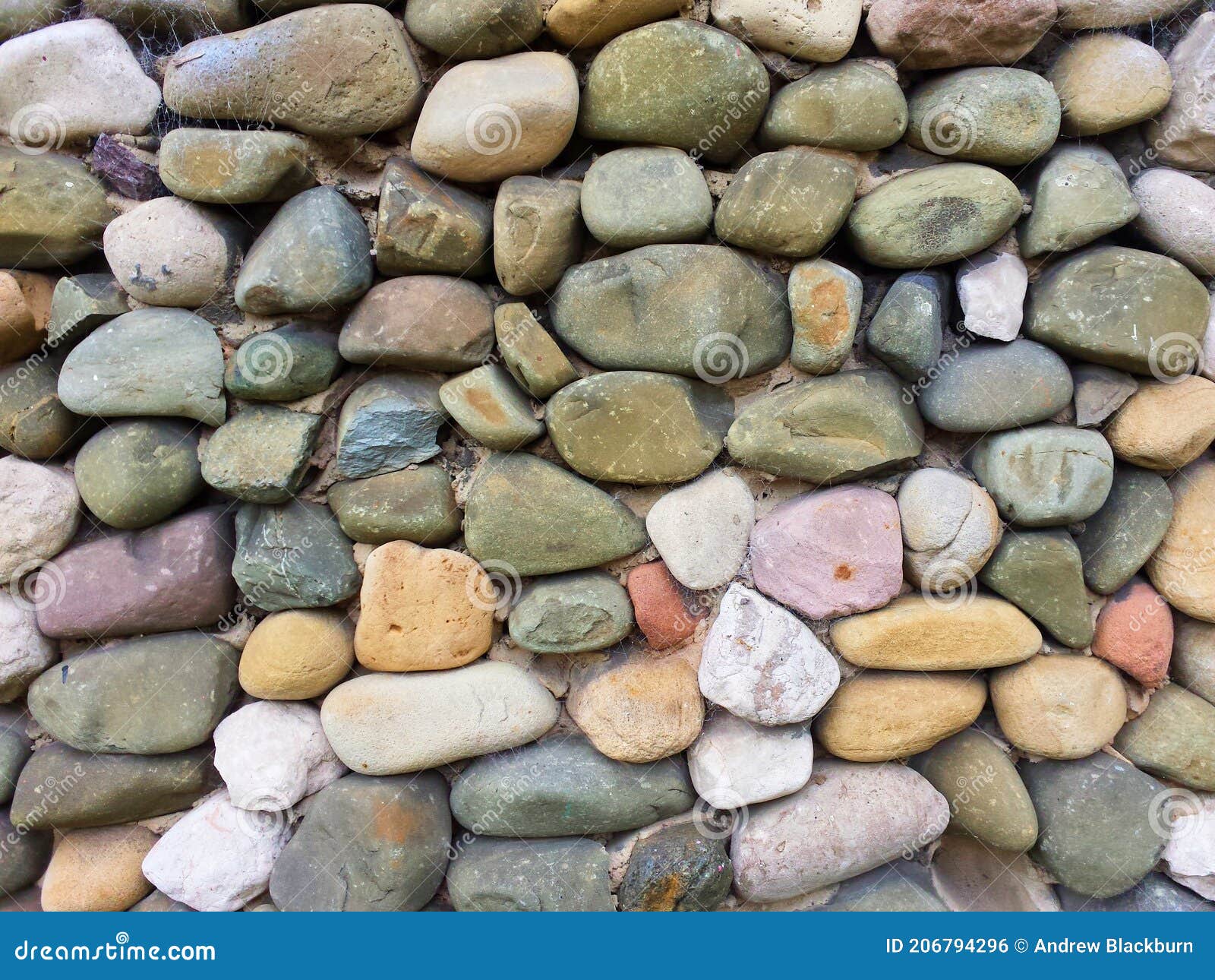 Pebble stone wall stock photo. Image of decoration, closeup - 206794296