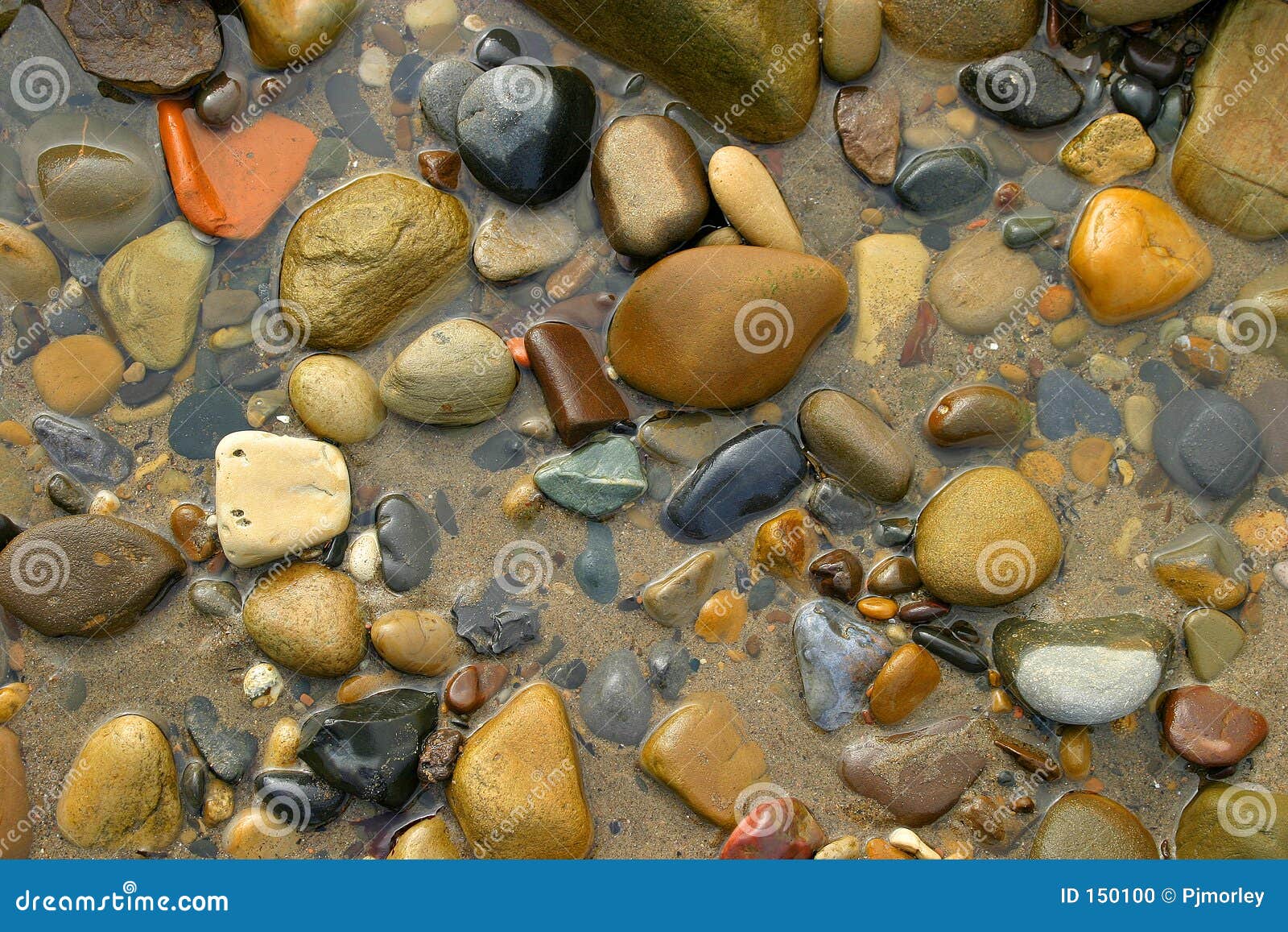 Pebbles on the Beach stock photo. Image of stone, sandy - 150100