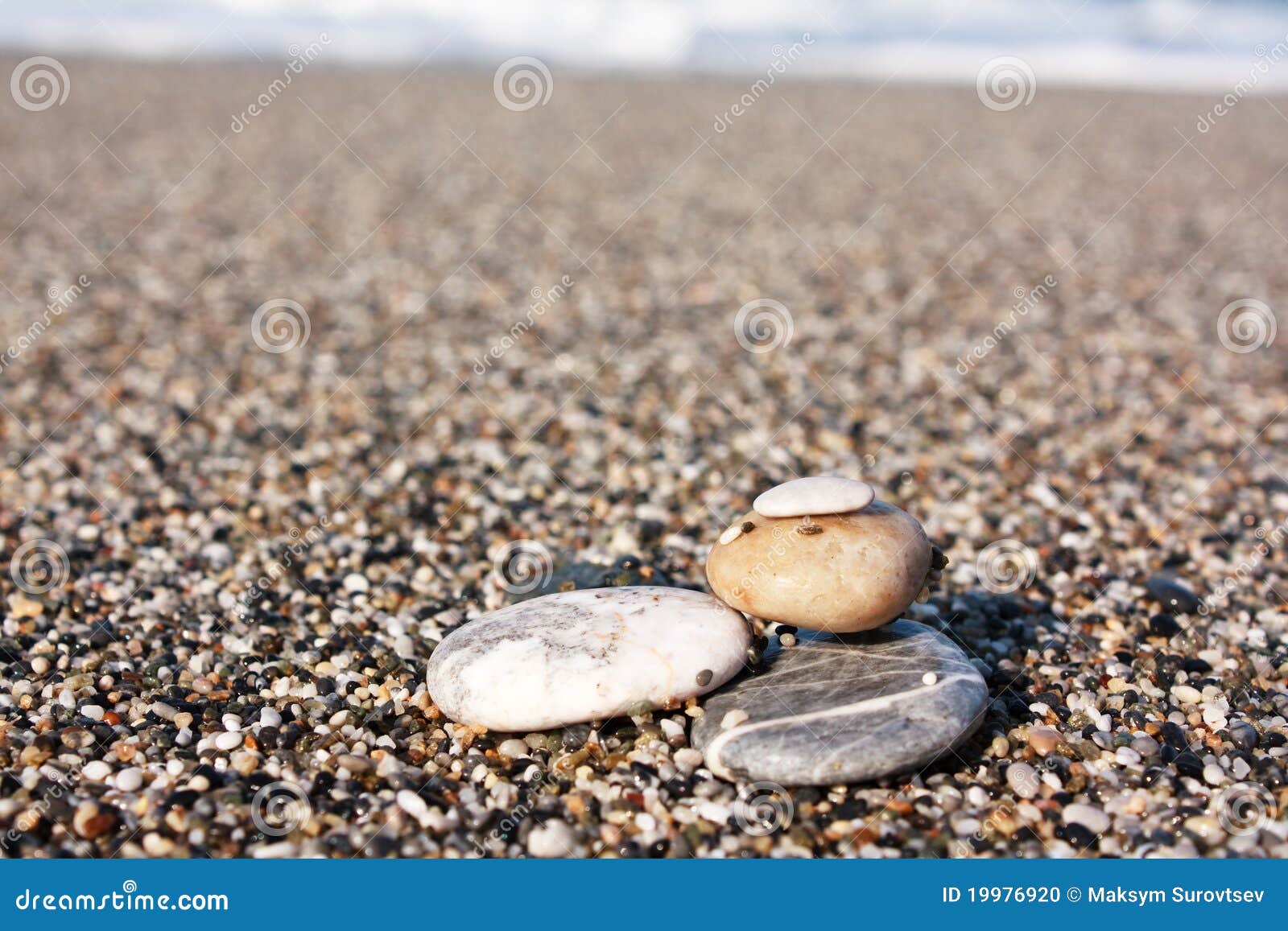 Pebbles on a beach stock photo. Image of random, coastline - 19976920