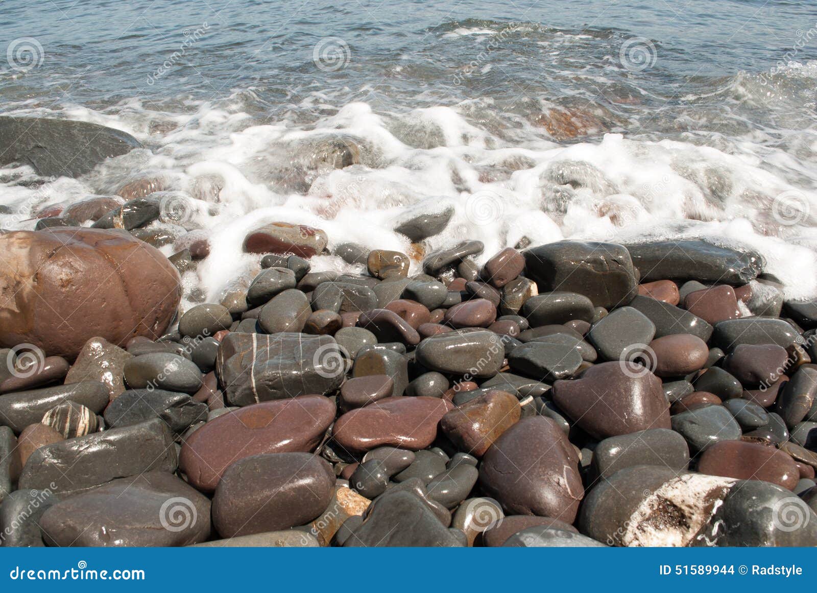 Pebbles on the Beach Being Washed by Wave Stock Photo - Image of grey ...