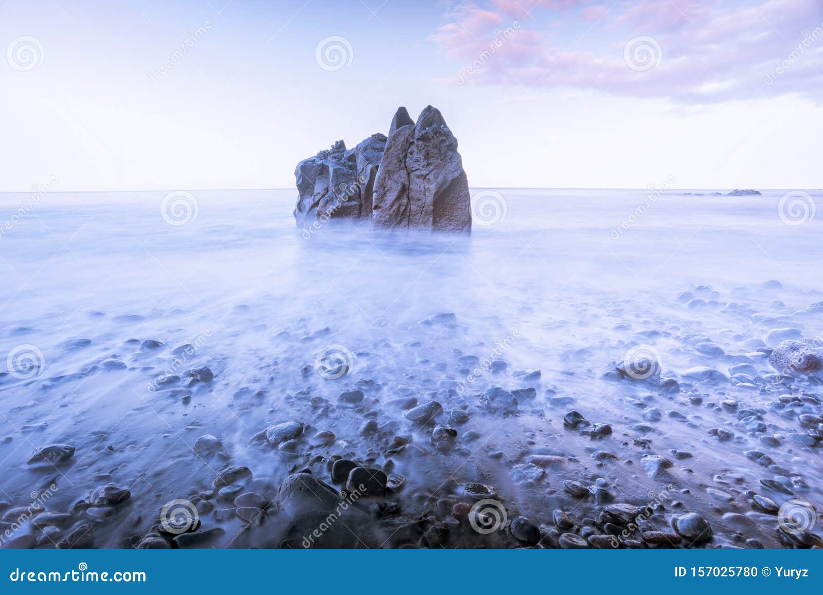 Pebbles beach by dawn stock photo. Image of exposure - 157025780