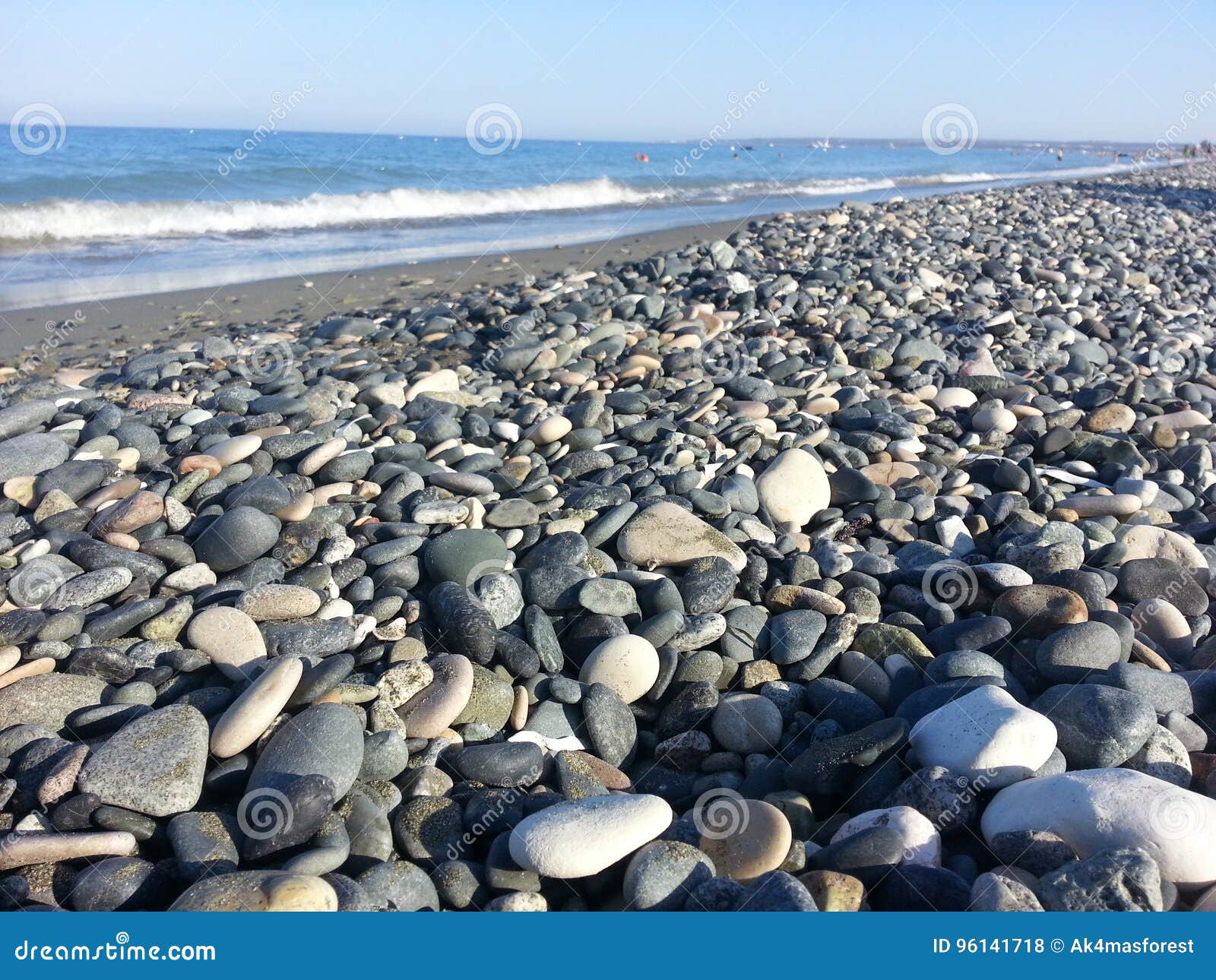 Pebbles On The Beach Being Washed By Wave Stock Photo | CartoonDealer ...