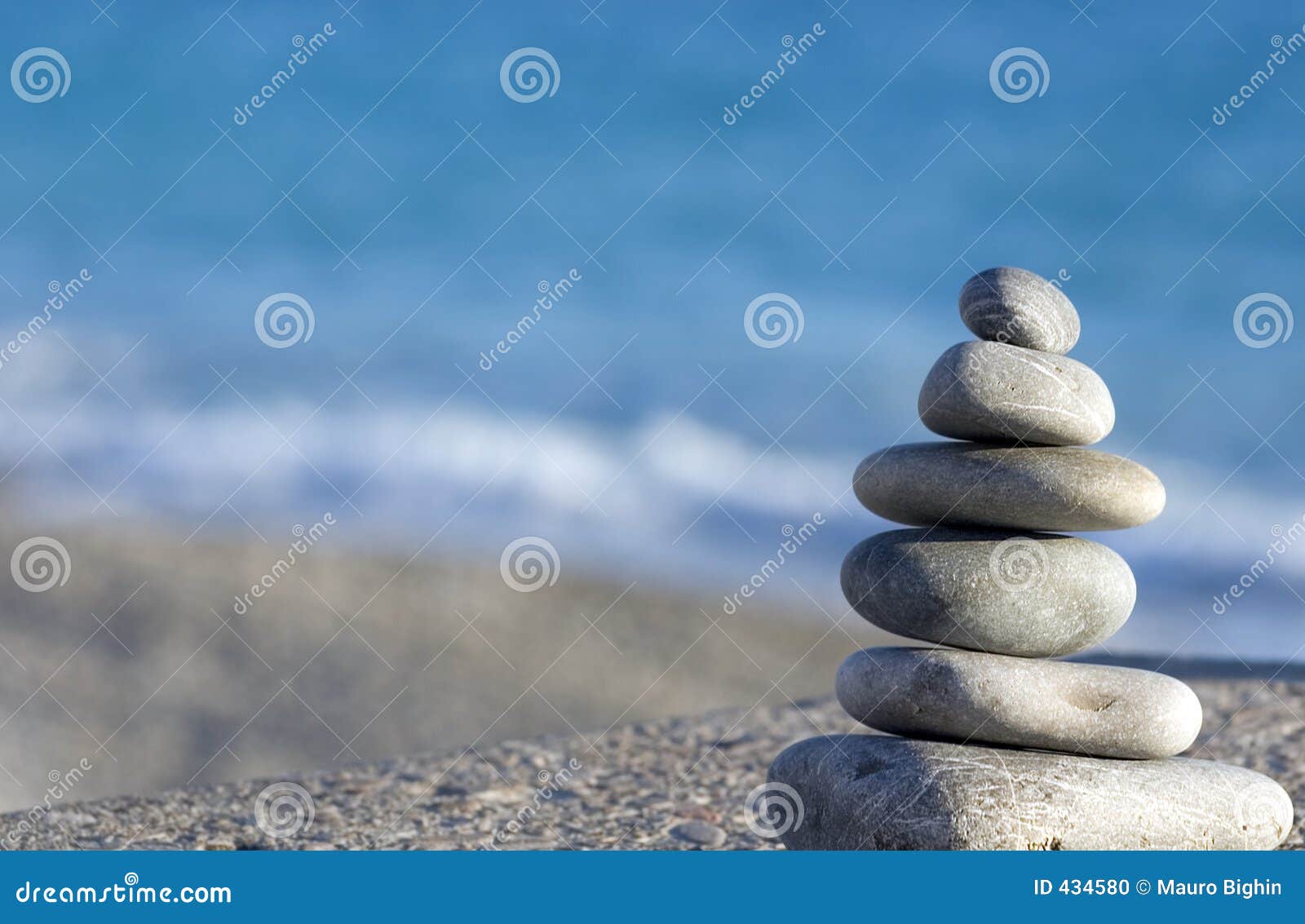 Pebbles on the blue sea stock photo. Image of simple, stones - 434580