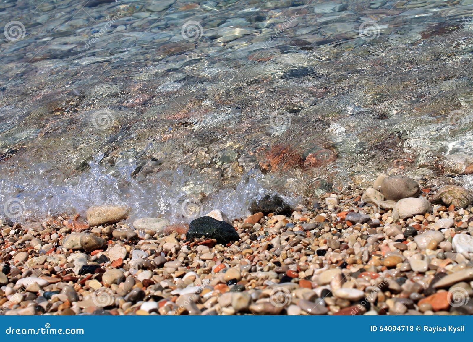 Pebbles in the clear water stock photo. Image of stone - 64094718