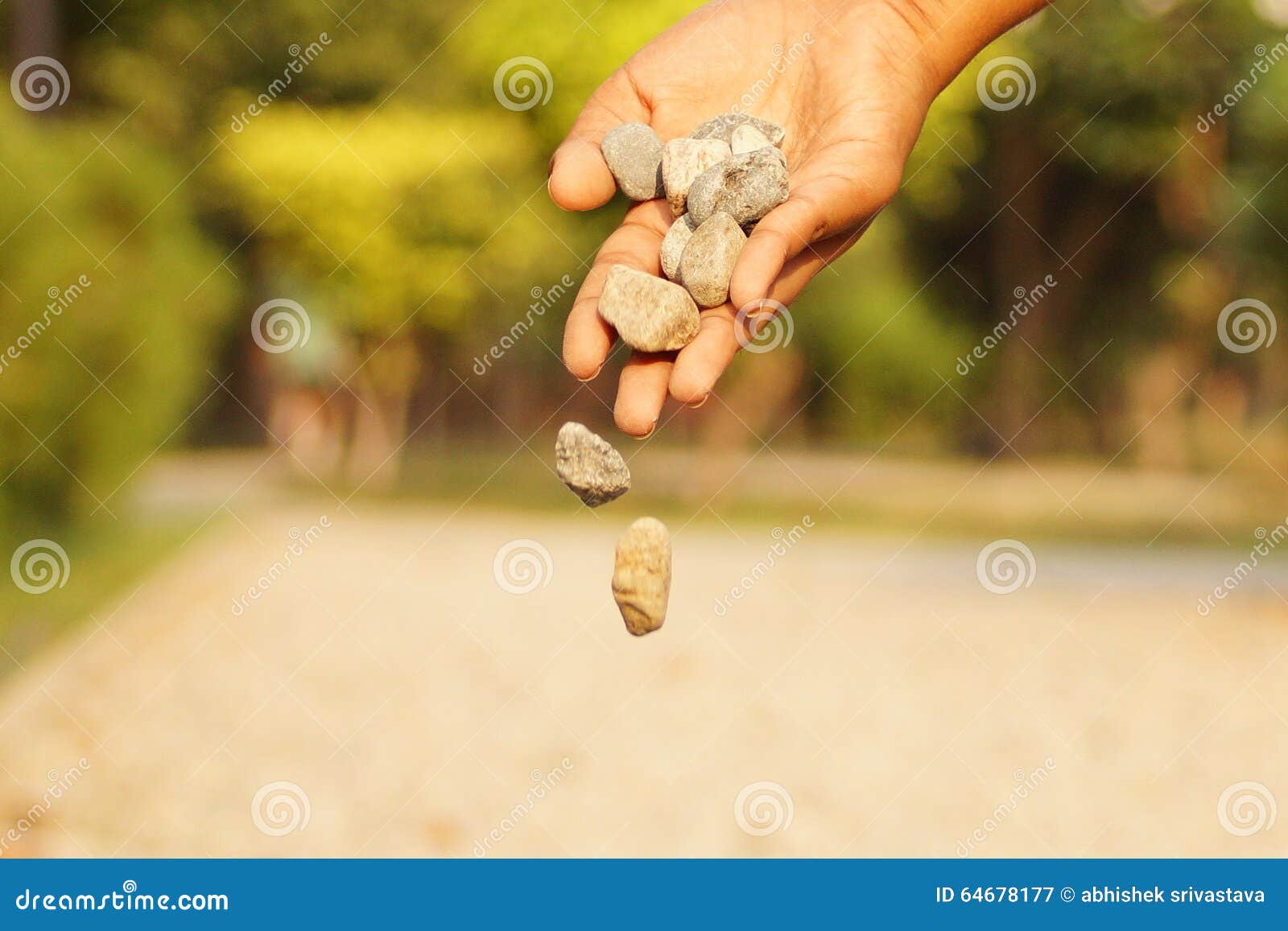 Pebbles stock image. Image of pebbles, hand, falling - 64678177