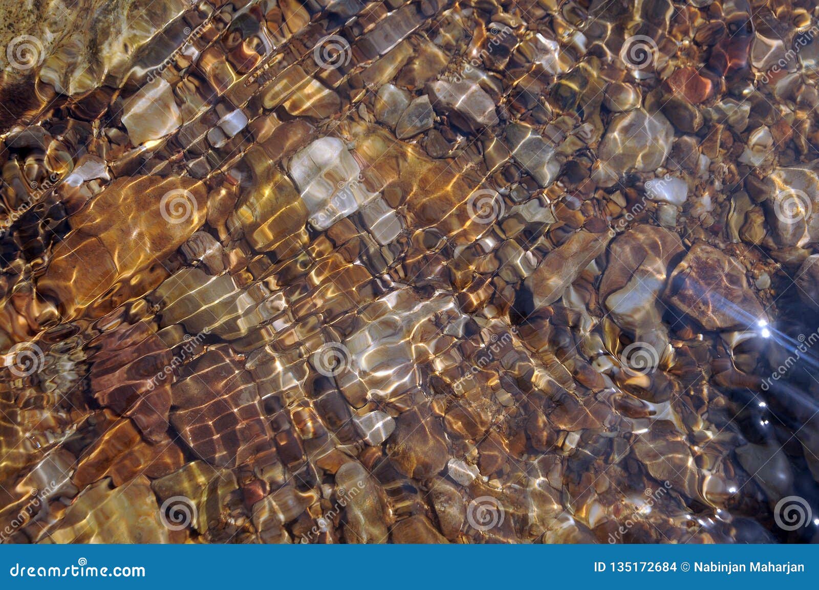 Riverbed Pebbles Wave stock photo. Image of sunrise - 135172684