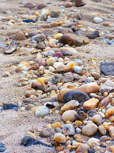Pebbles in the sand stock photo. Image of erosion, nature - 4656860