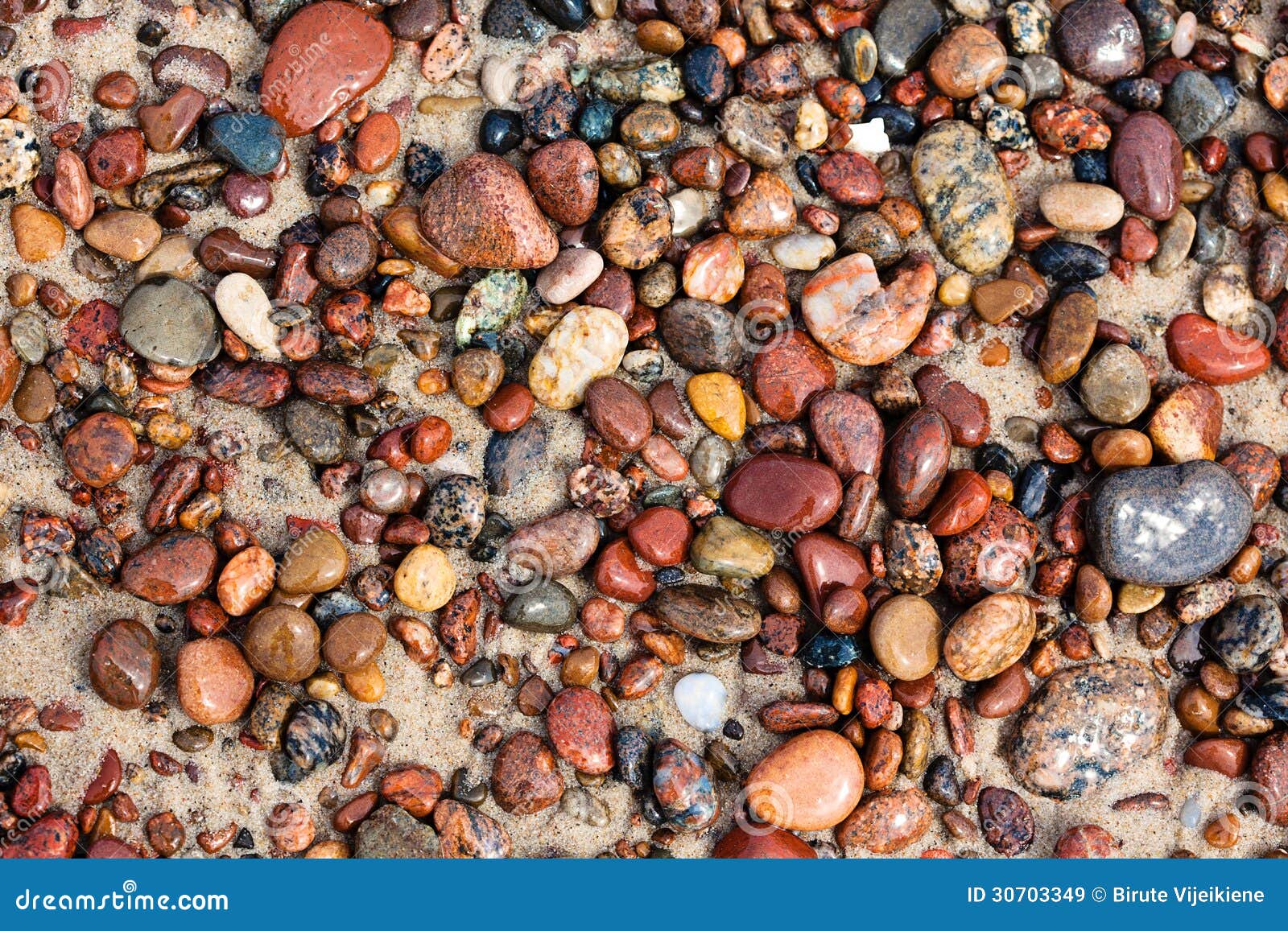 Pebbles on the sand stock image. Image of stones, material - 30703349