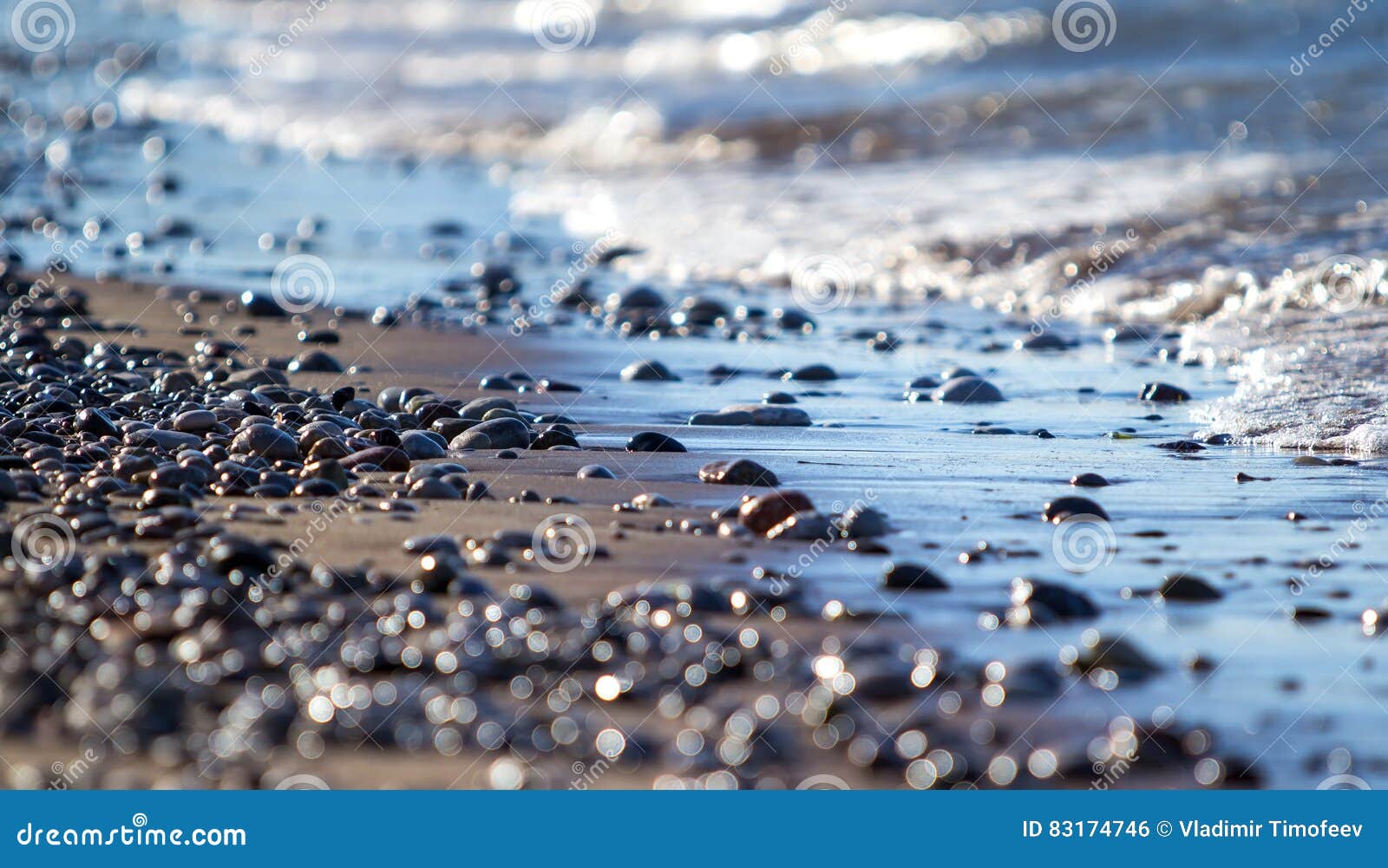 Pebbles among the Sand on Seashore. Close-up Blur Stock Photo - Image ...