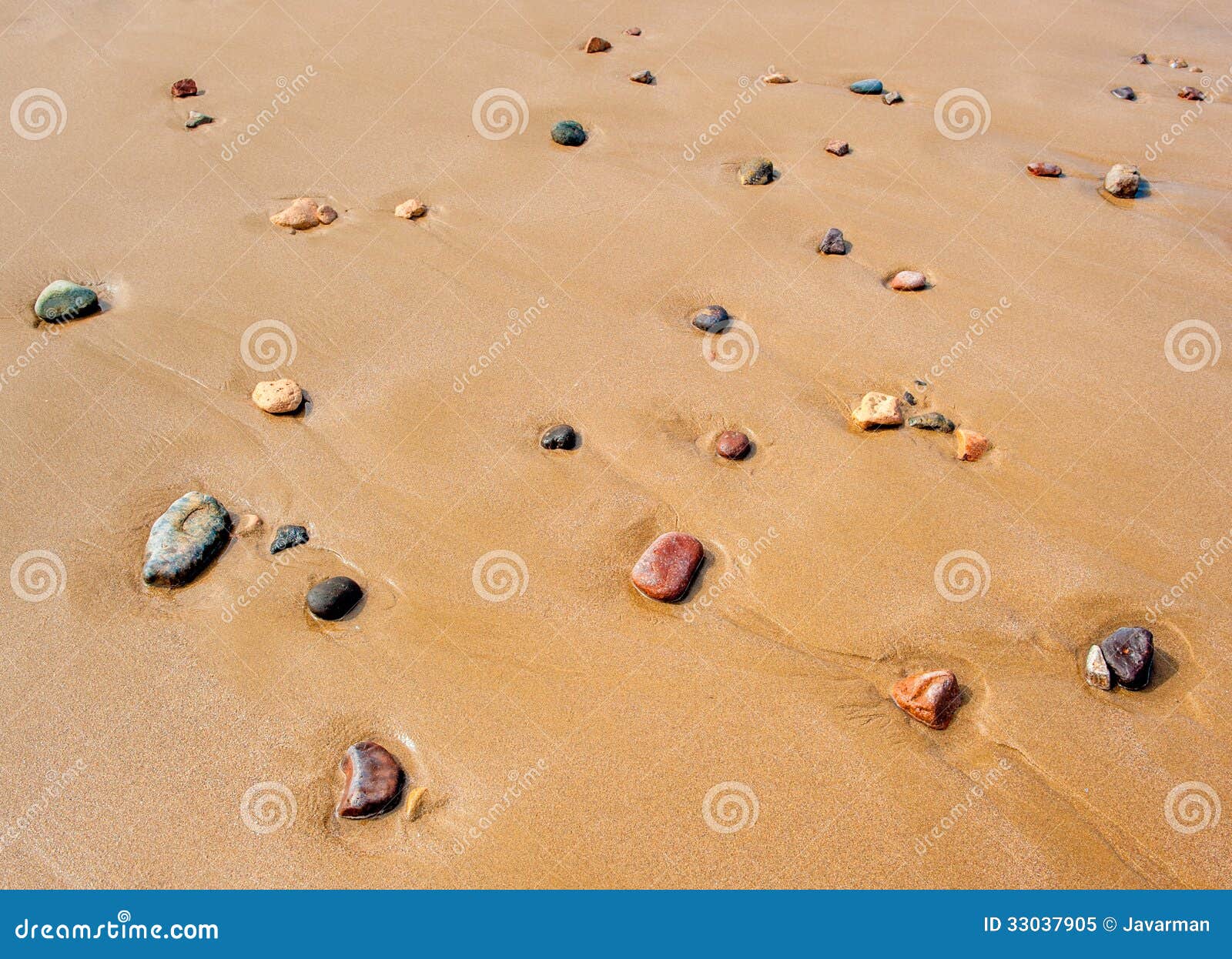 Pebbles in sandy beach stock image. Image of white, clouds - 33037905