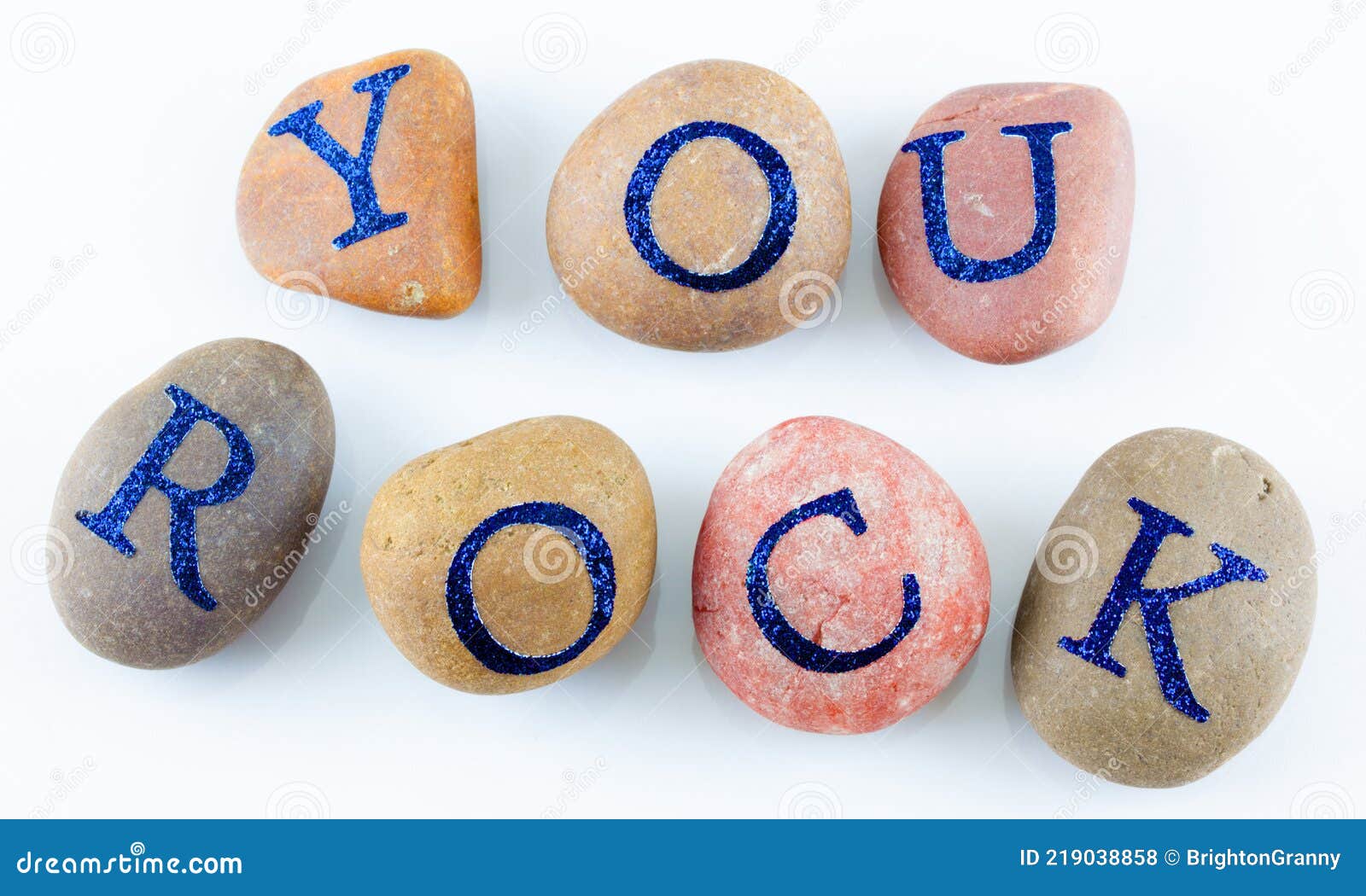 Pebbles Spelling Out "You Rock" Stock Photo - Image of colourful ...