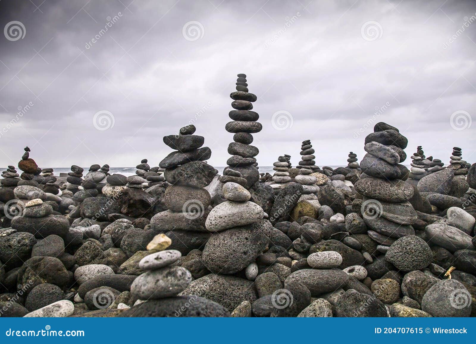 Pebbles Stacked on Each Other in a Balance at the Beach Stock Image ...