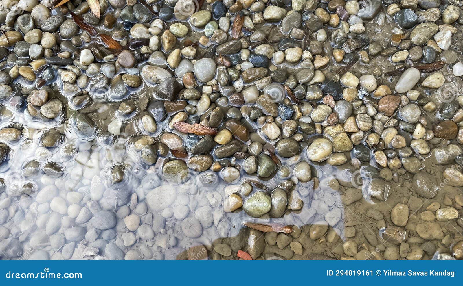 Pebbles in the Water on the Beach in the Summer. Stock Image - Image of ...