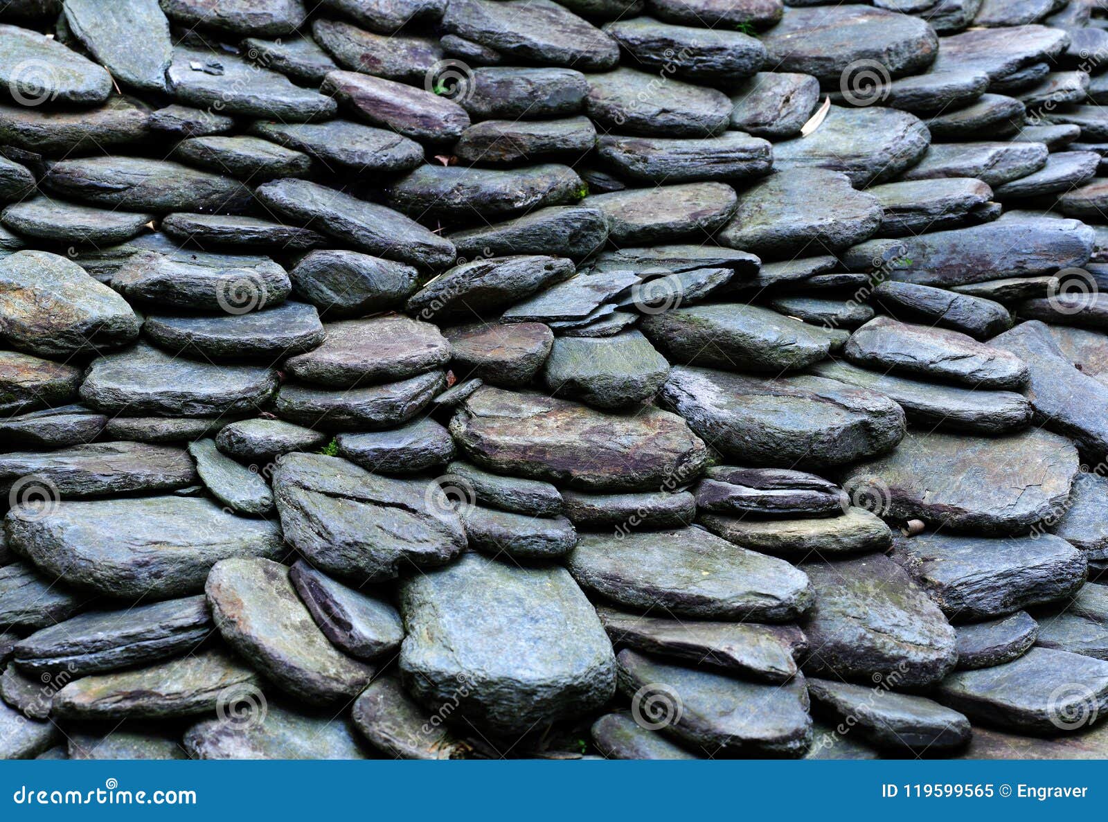 Pebblestone black sidewalk stock image. Image of decorations - 119599565