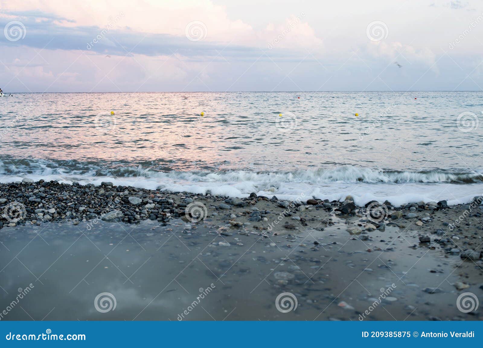 A Beautiful Cloudy Sunset Over the Beach. Sundown, Beachfront, Horizon ...