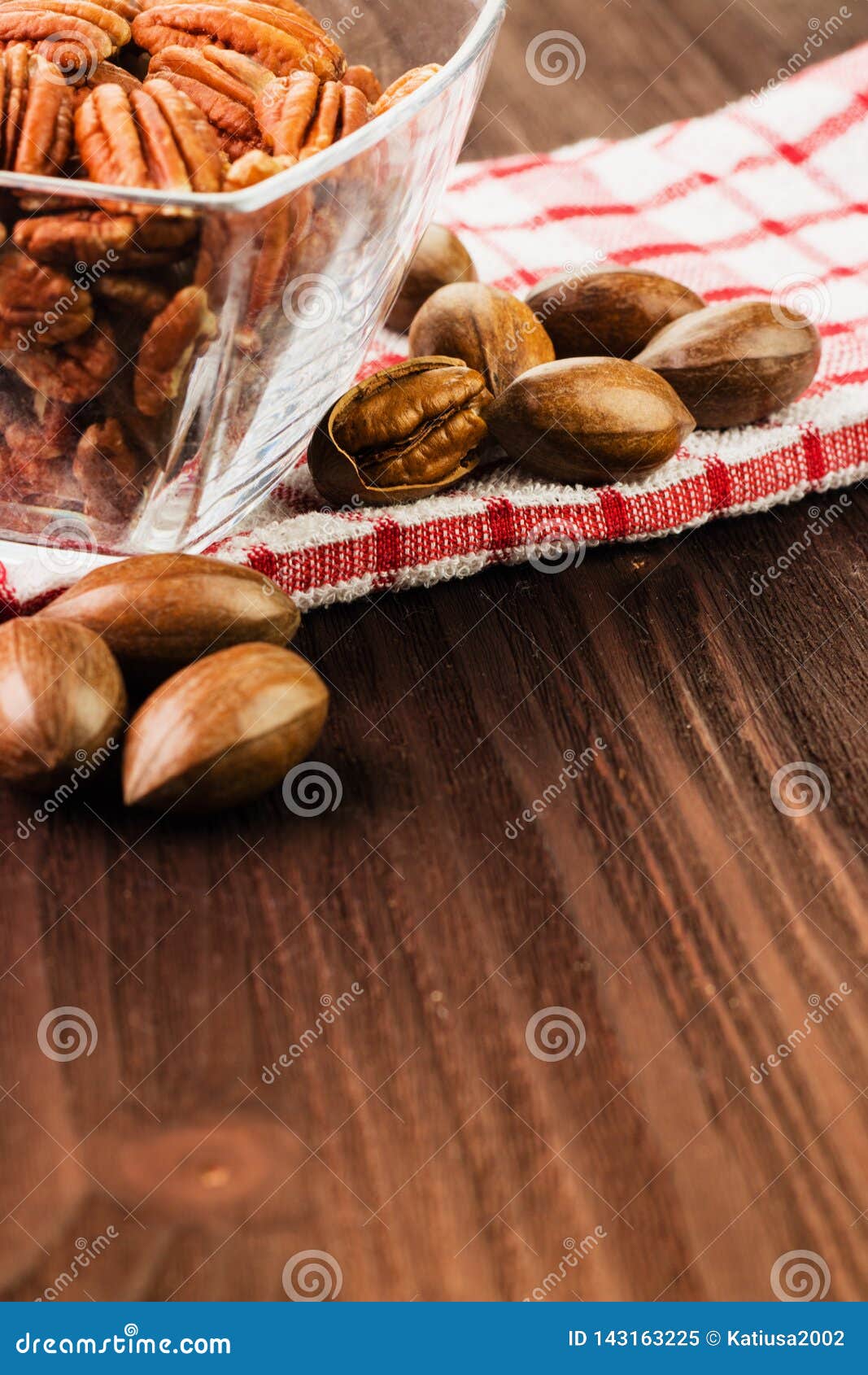 Pecan Nuts in the Shell with Pecan Kernel on Wooden Background Stock ...