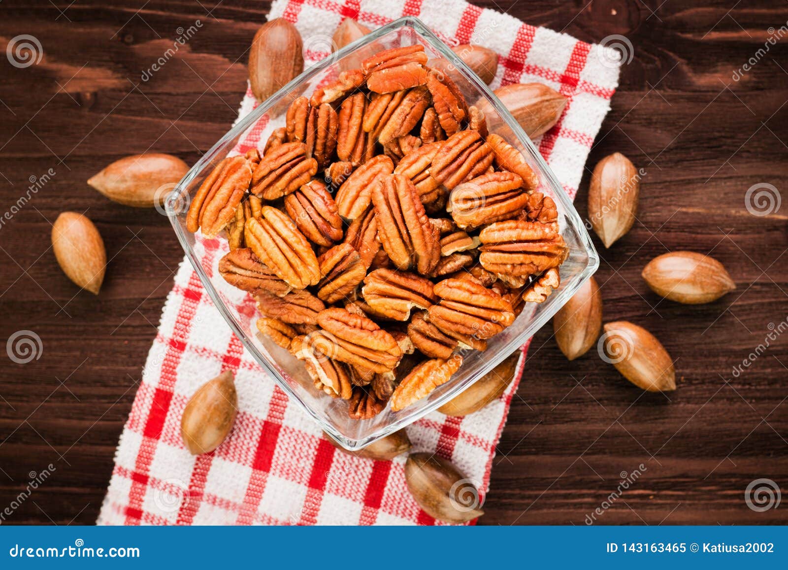 Pecan Nuts in the Shell with Pecan Kernel on Wooden Background Stock ...
