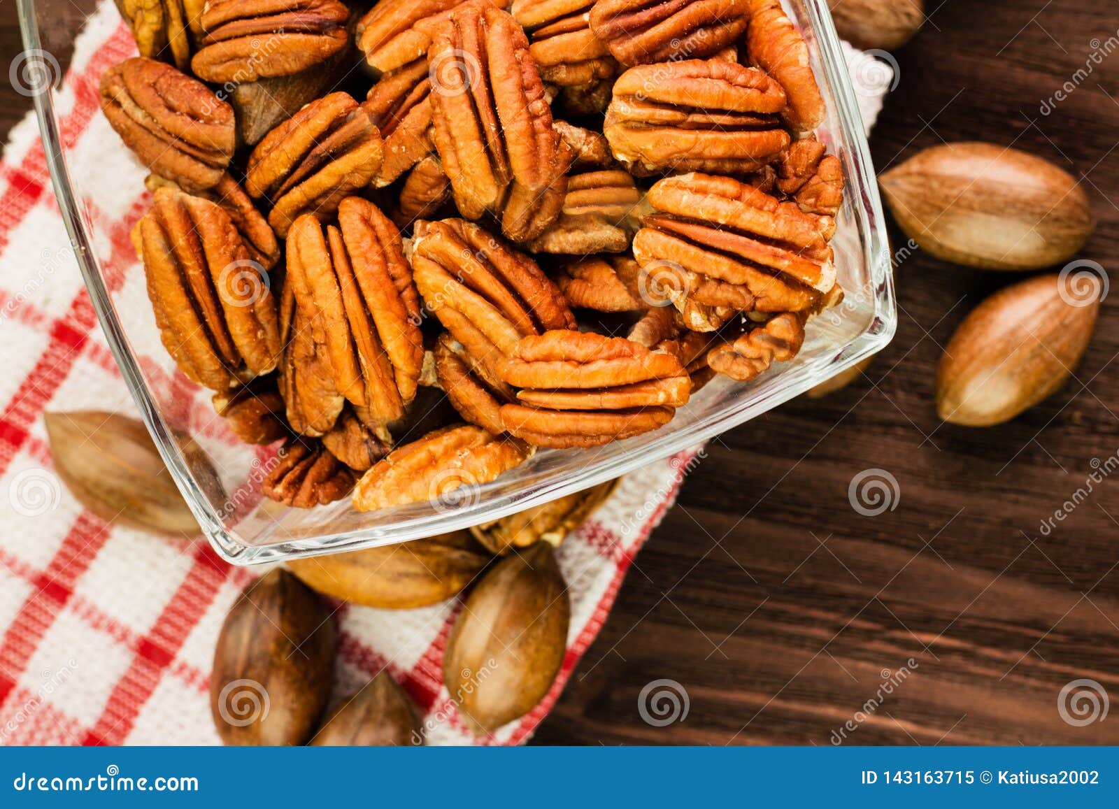 Pecan Nuts in the Shell with Pecan Kernel on Wooden Background Stock ...