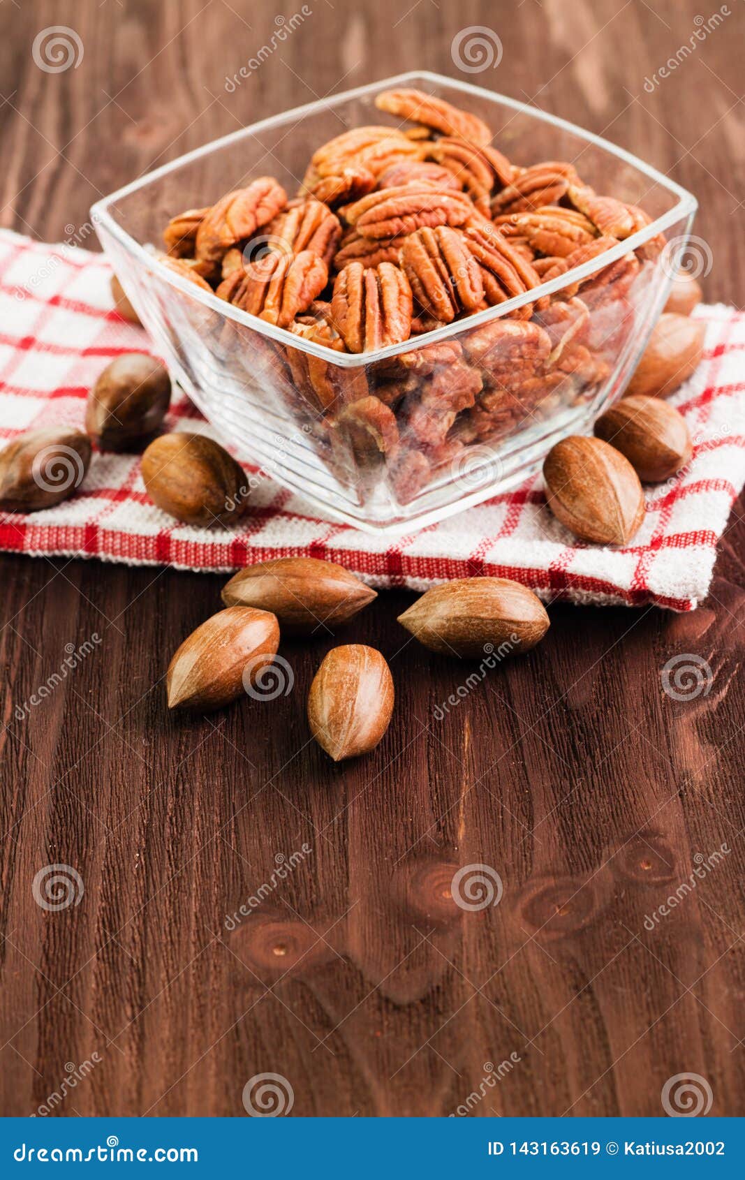 Pecan Nuts in the Shell with Pecan Kernel on Wooden Background Stock ...
