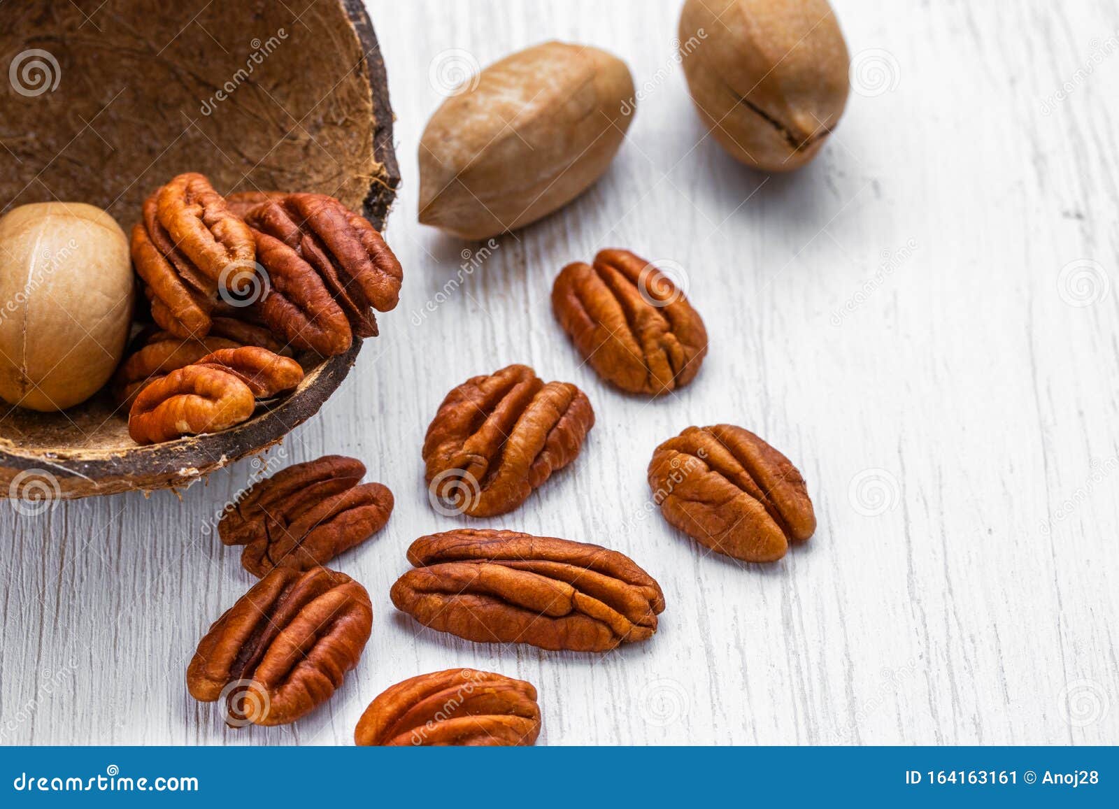 Pecans Peeled and in Shell Lying in Half the Coconut Shell and on a ...