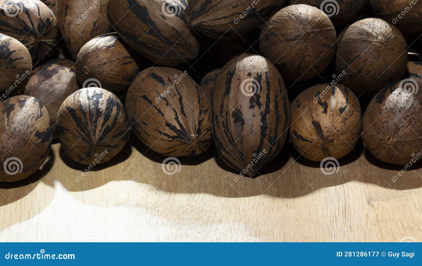 Pecans Still in Their Shells on a Table Stock Image - Image of ...