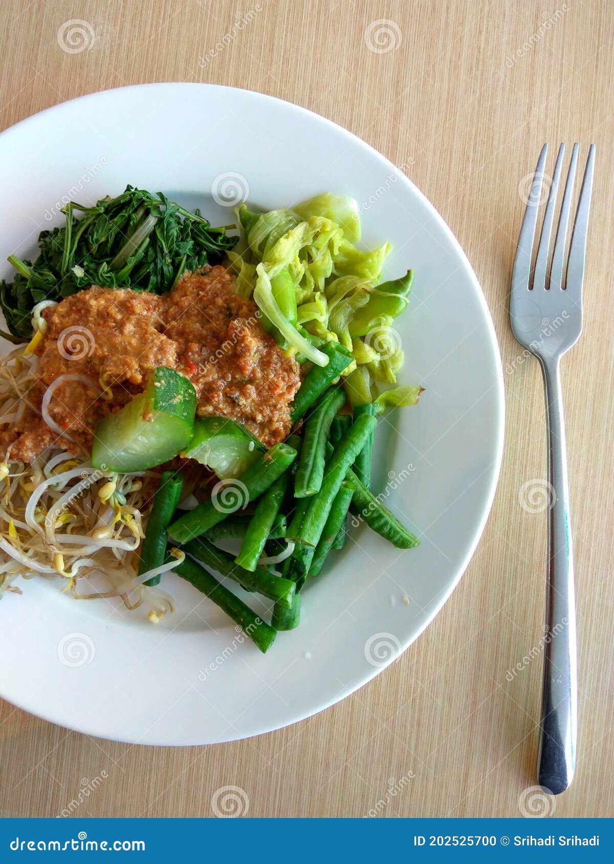 A plate of pecel stock photo. Image of seafood, typical - 202525700