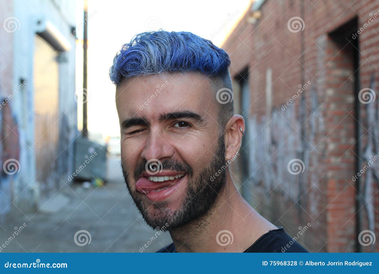 Peculiar Guy Making a Funny Face Stock Photo - Image of dyed, cheerful ...