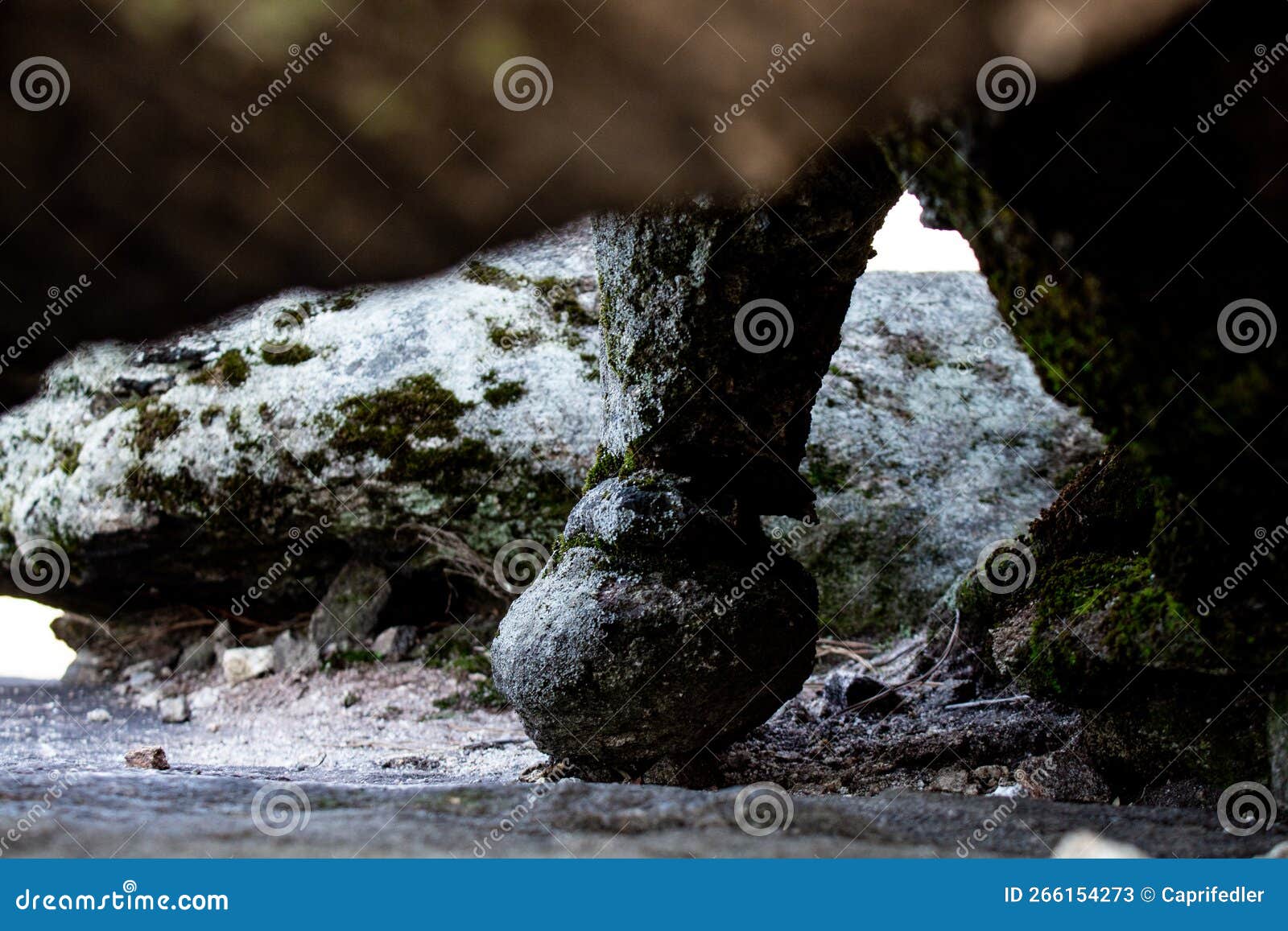 Peculiar Rock Formation Underneath a Boulder Stock Image - Image of ...