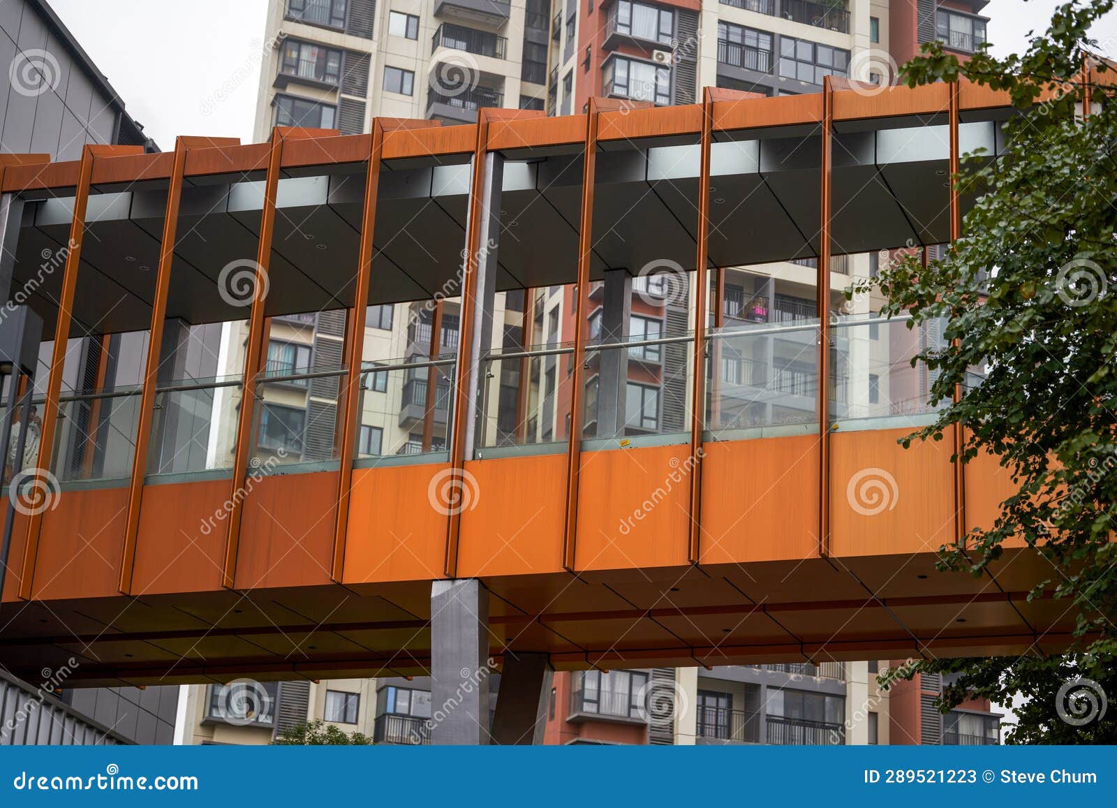 Pedestrian Bridge between City Buildings Stock Image - Image of ...