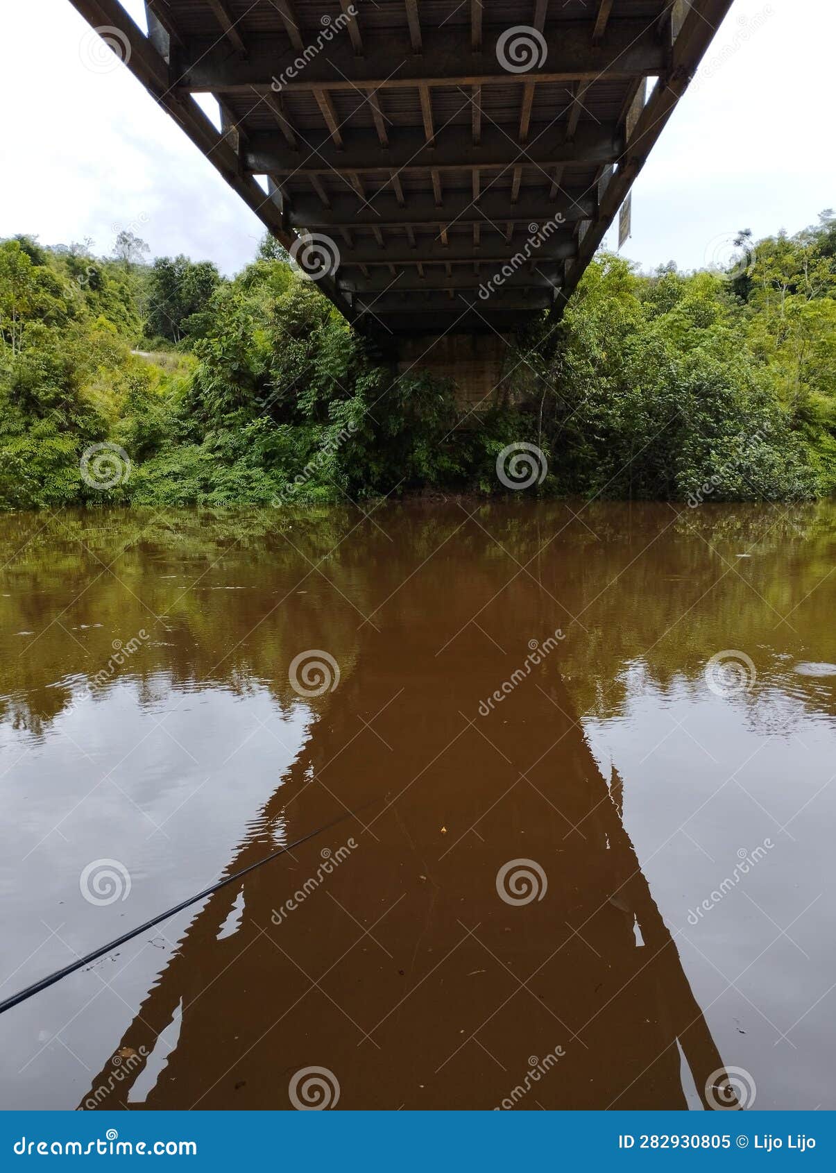 A Pedestrian Bridge Over a River To Connect the Mainland Stock Image ...