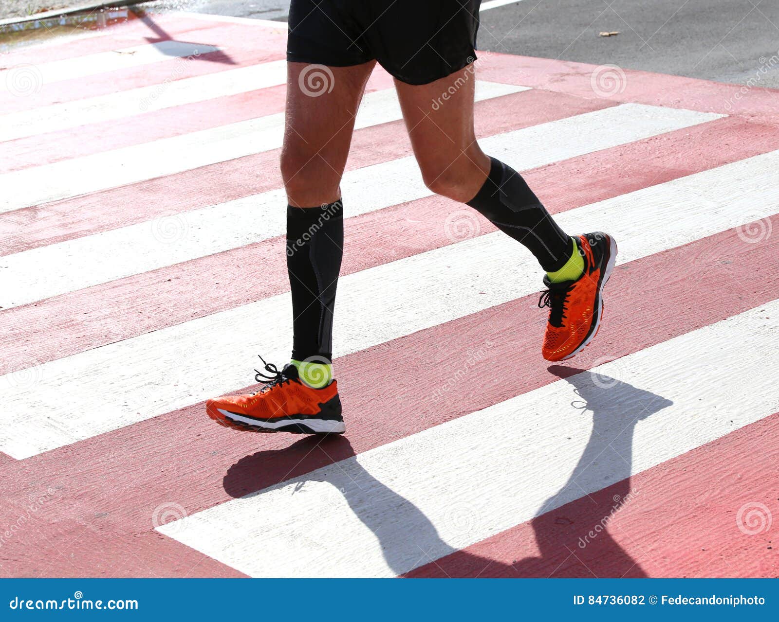 Pedestrian Crossing with a Runner Who Runs Fast Stock Photo - Image of ...