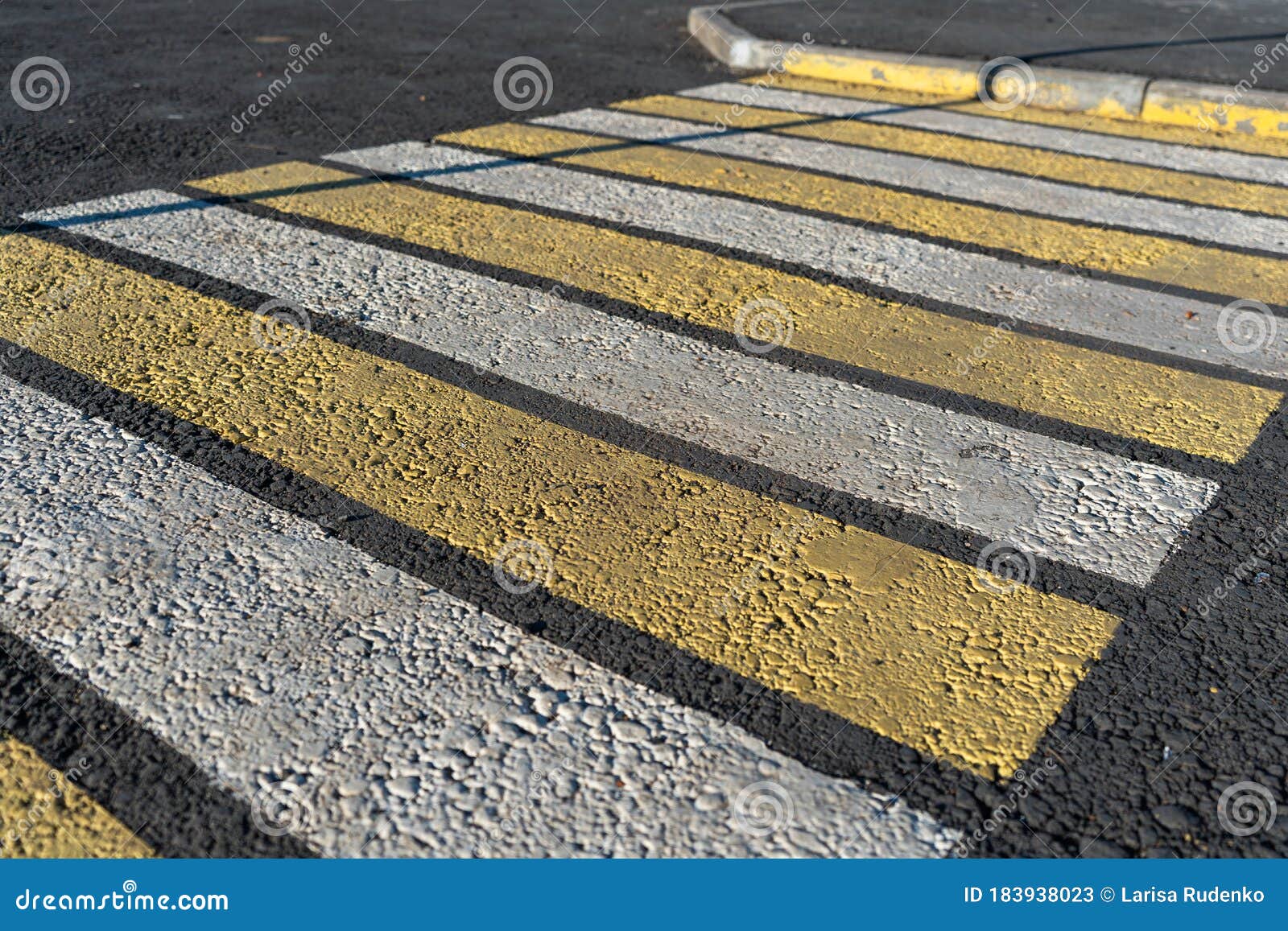 Pedestrian Crosswalk with Yellow and White Lines on the Asphalt Stock ...