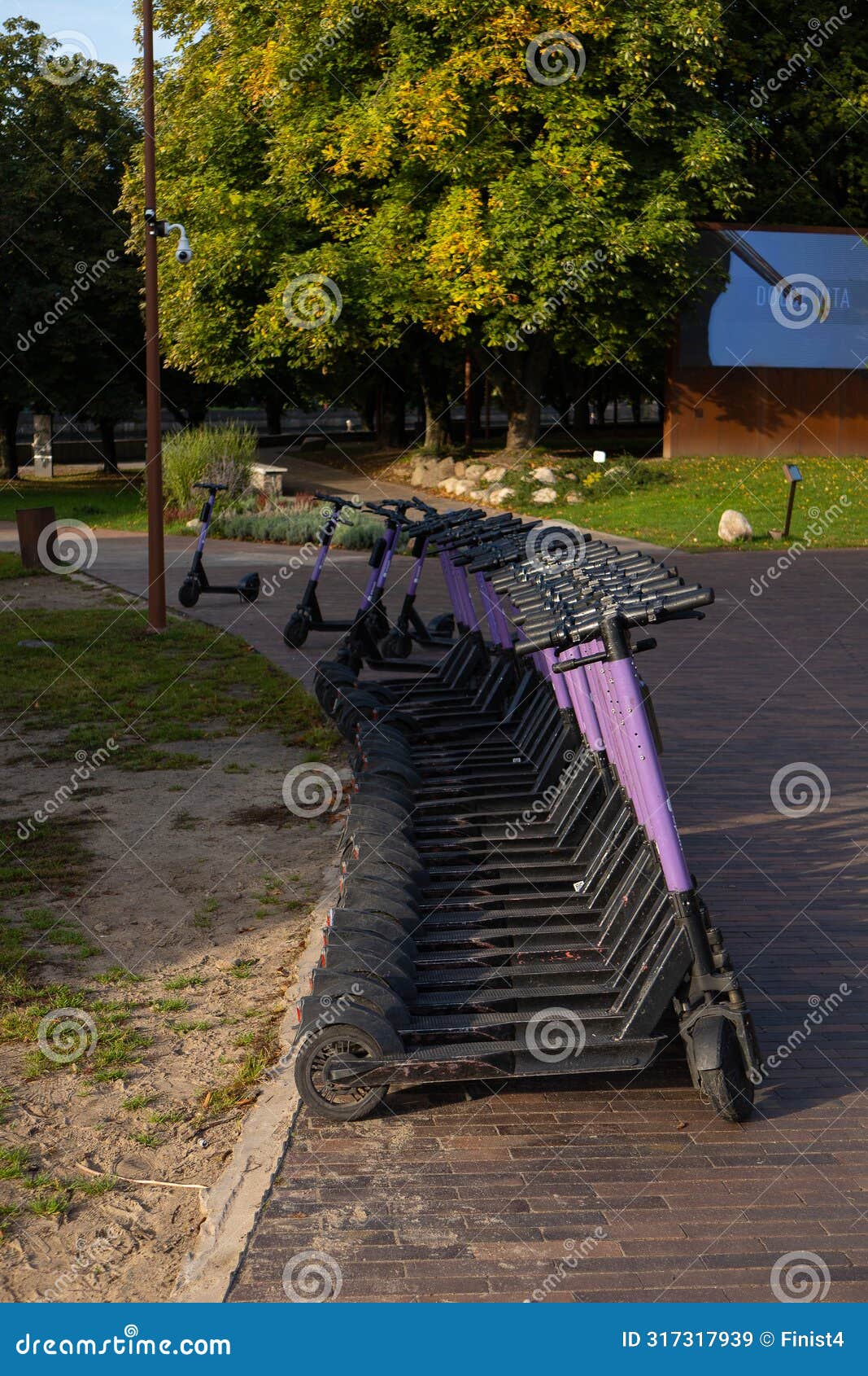 Pedestrian Path and Scooters for Rental Standing in a Row Editorial ...