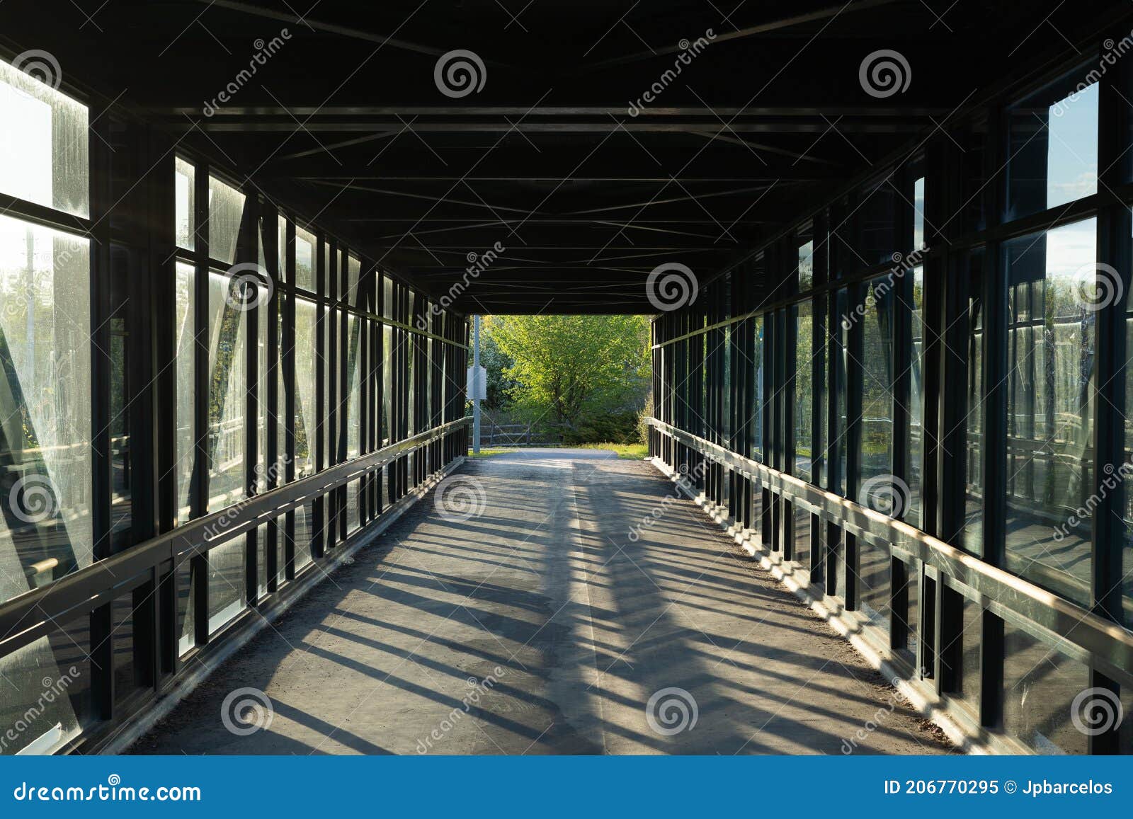 Pedestrian Pathway Above Highway, Golden Light Shining Creating Shadows ...