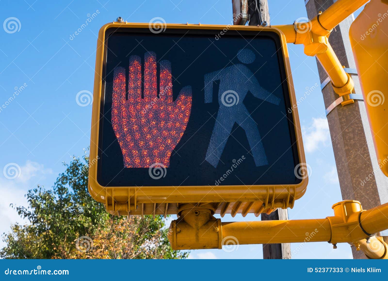 A Pedestrian Stop Sign Appears On A Crosswalk Stock Image ...