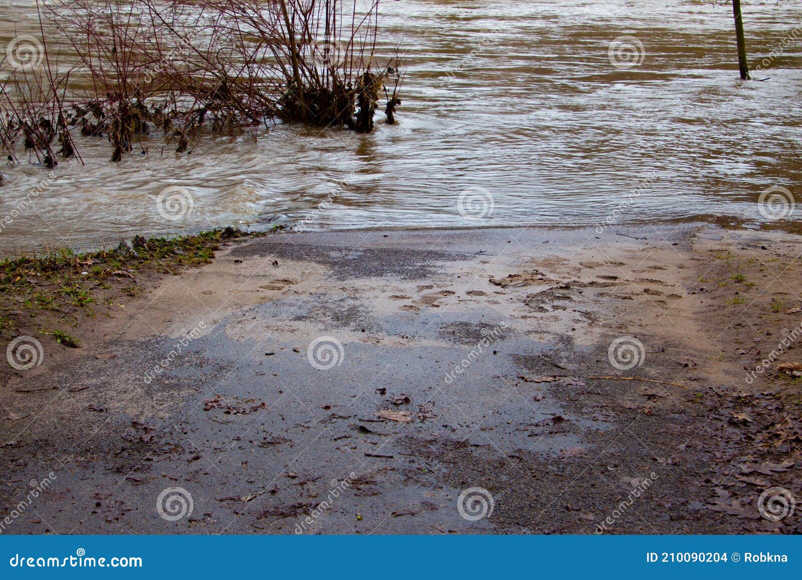 Pedestrian Walkway Leading into the Floods of a River Stock Photo ...
