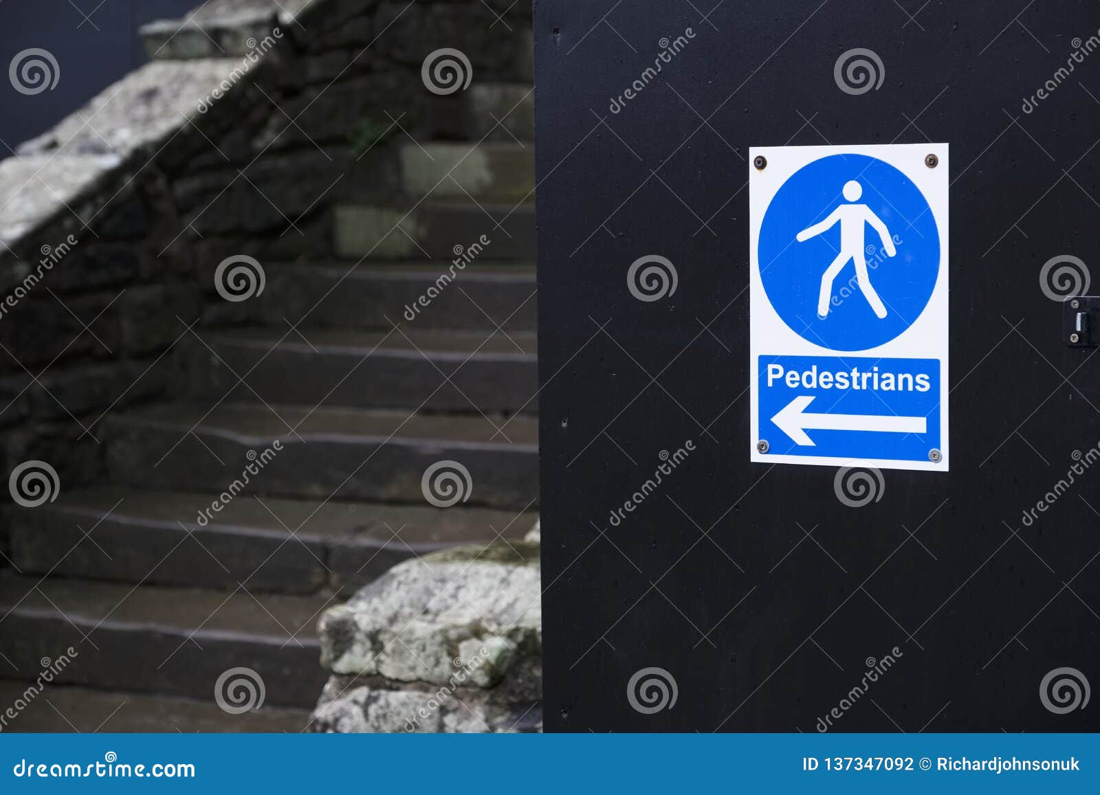 Pedestrians Direction Arrow Sign and Steps Stock Photo - Image of ...