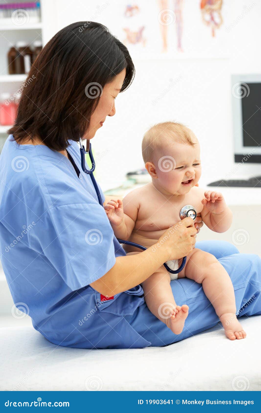 Pediatrician with baby stock image. Image of looking - 19903641