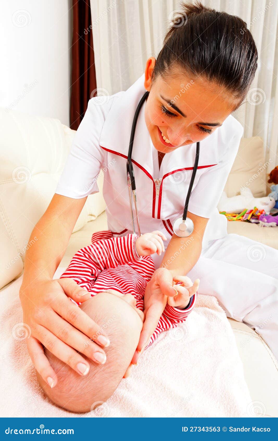 Pediatrician checking baby stock image. Image of care - 27343563