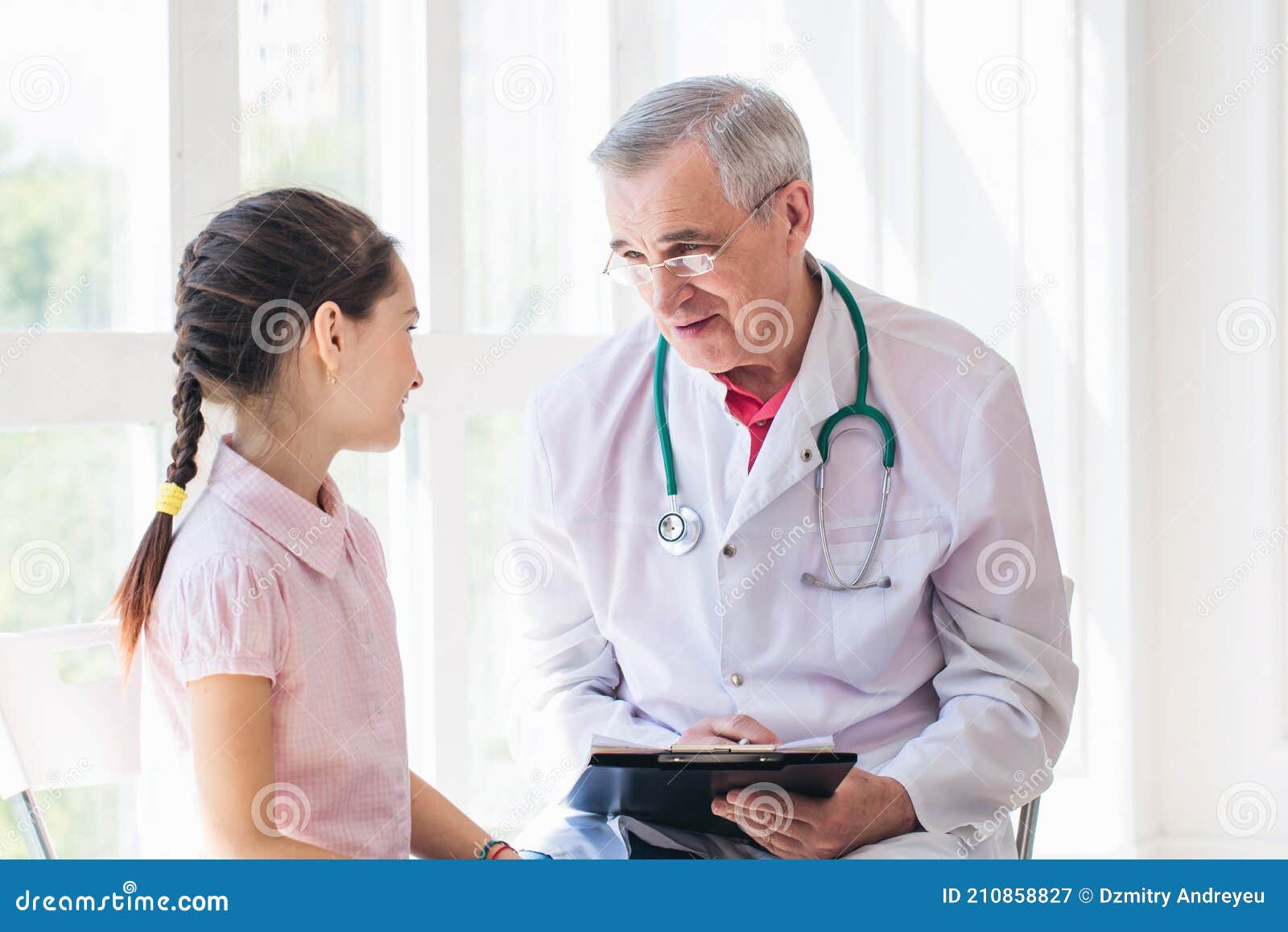 Pediatrician Doctor Examining Child Stock Image - Image of illness ...