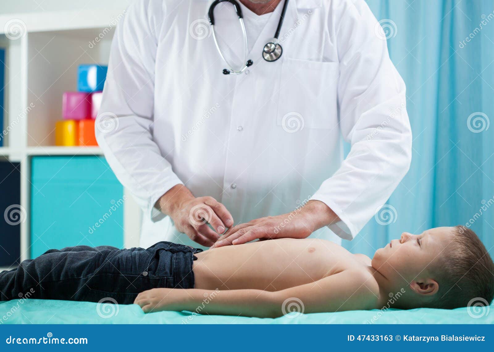 Pediatrician Doing Abdominal Examination Stock Image - Image of illness ...