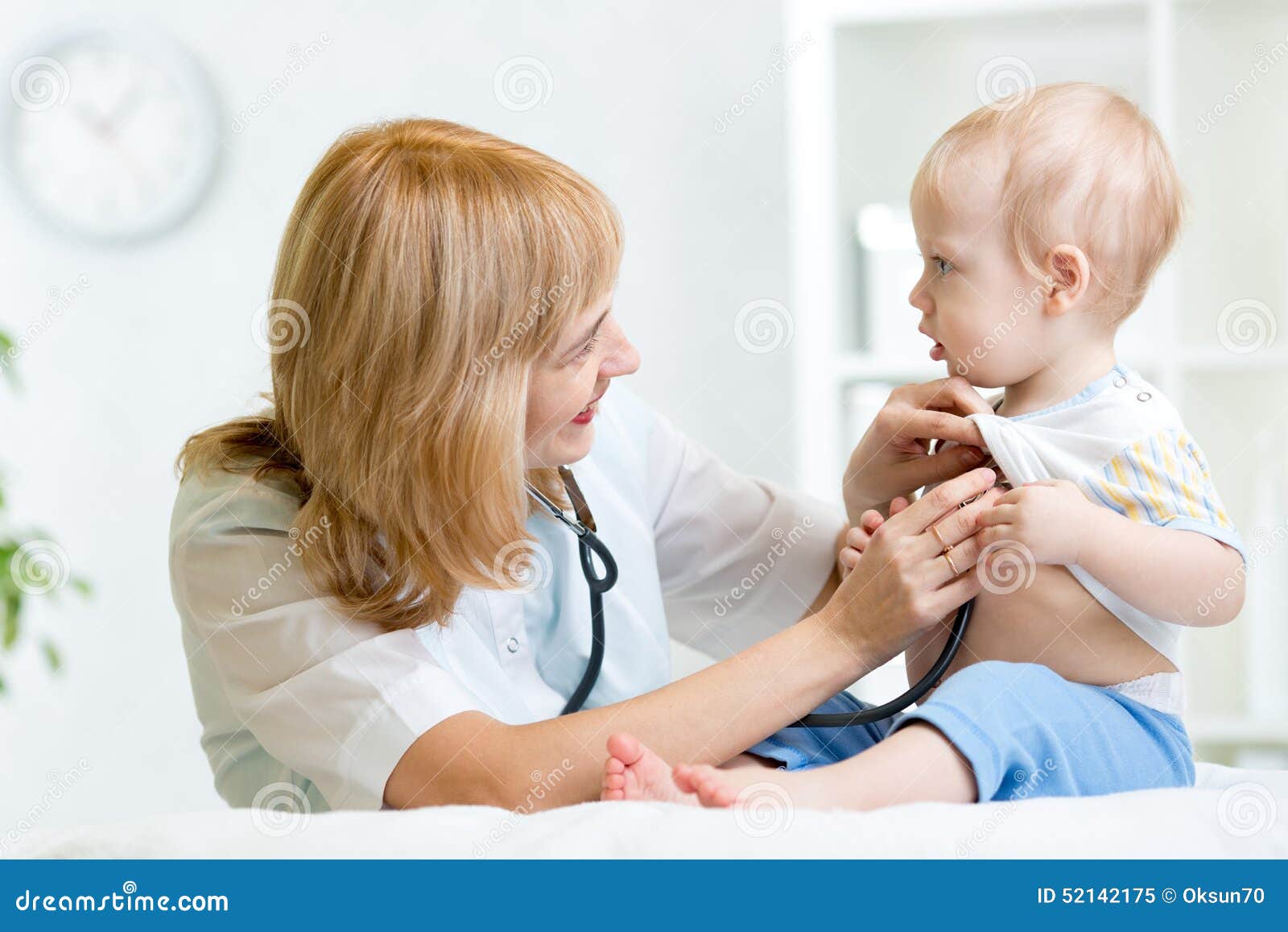 Pediatrician Examining Heartbeat of Kid with Stock Image - Image of ...