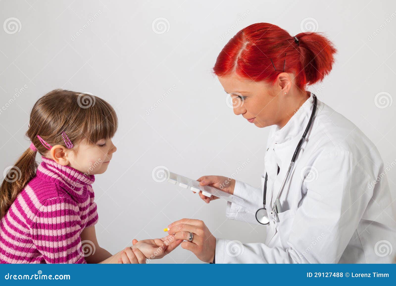 The Pediatrician Gives Her Patient a Tablet Stock Photo - Image of ...