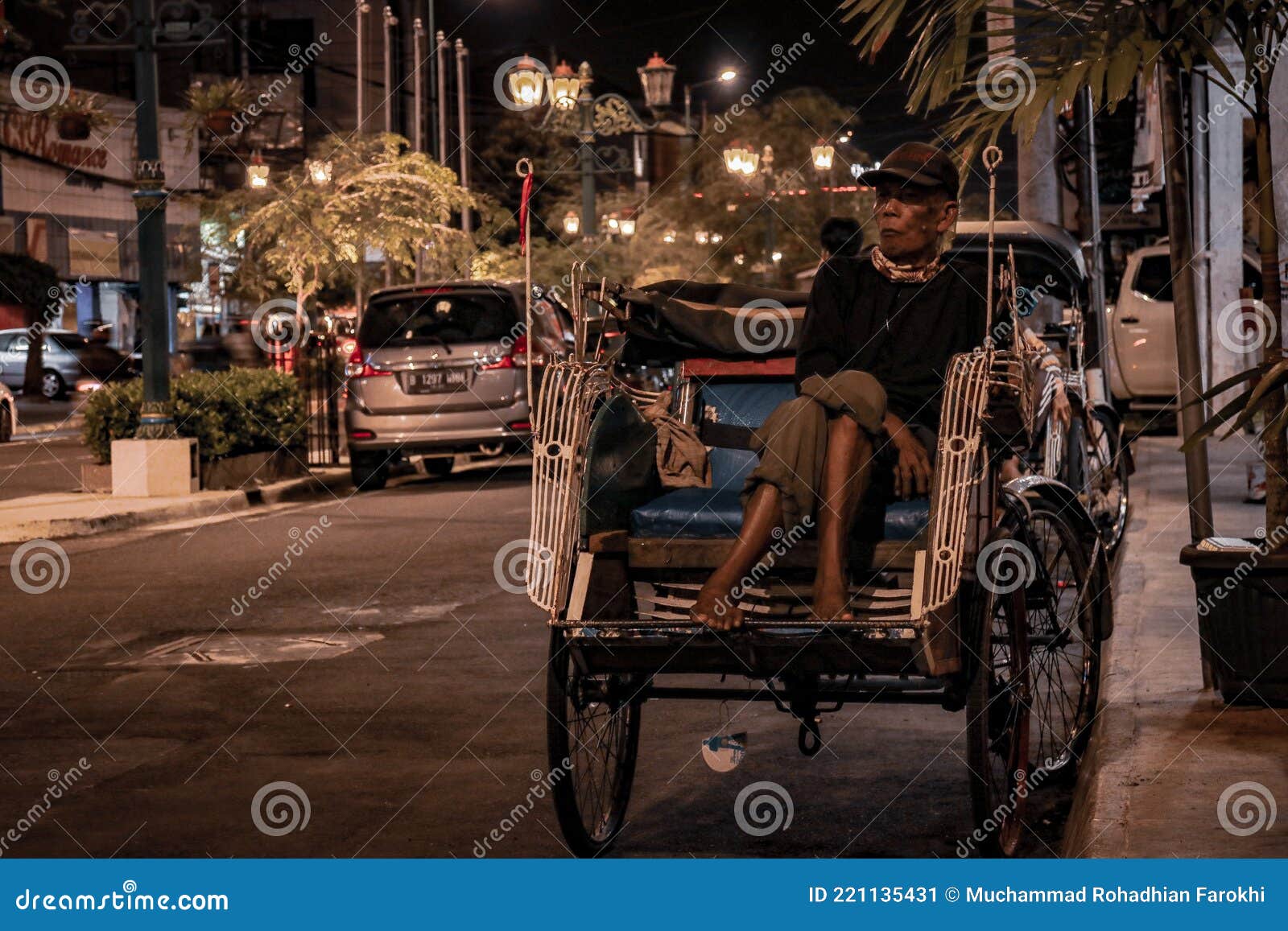 Pedicab driver editorial photo. Image of person, night - 221135431