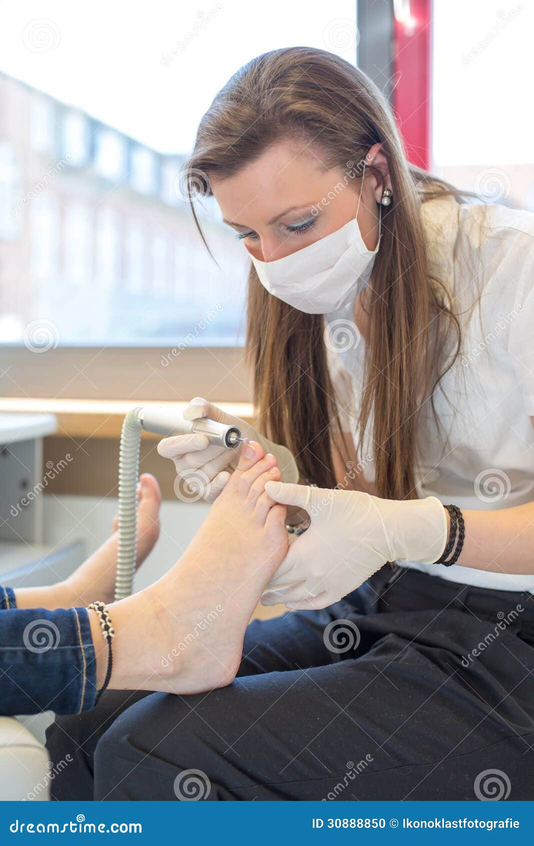 Pedicure Grinding Toe Nails Stock Photo - Image of beautician ...