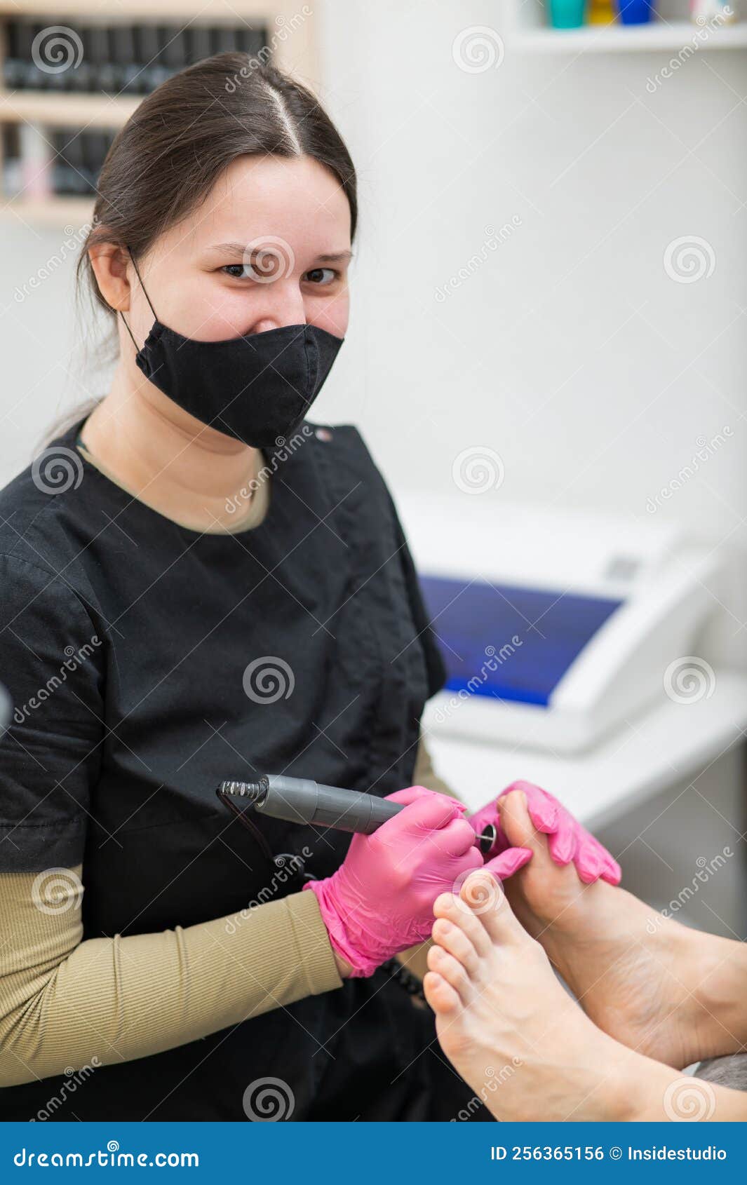 The Pedicure Master Processes the Client S Foot Using an Apparatus with ...