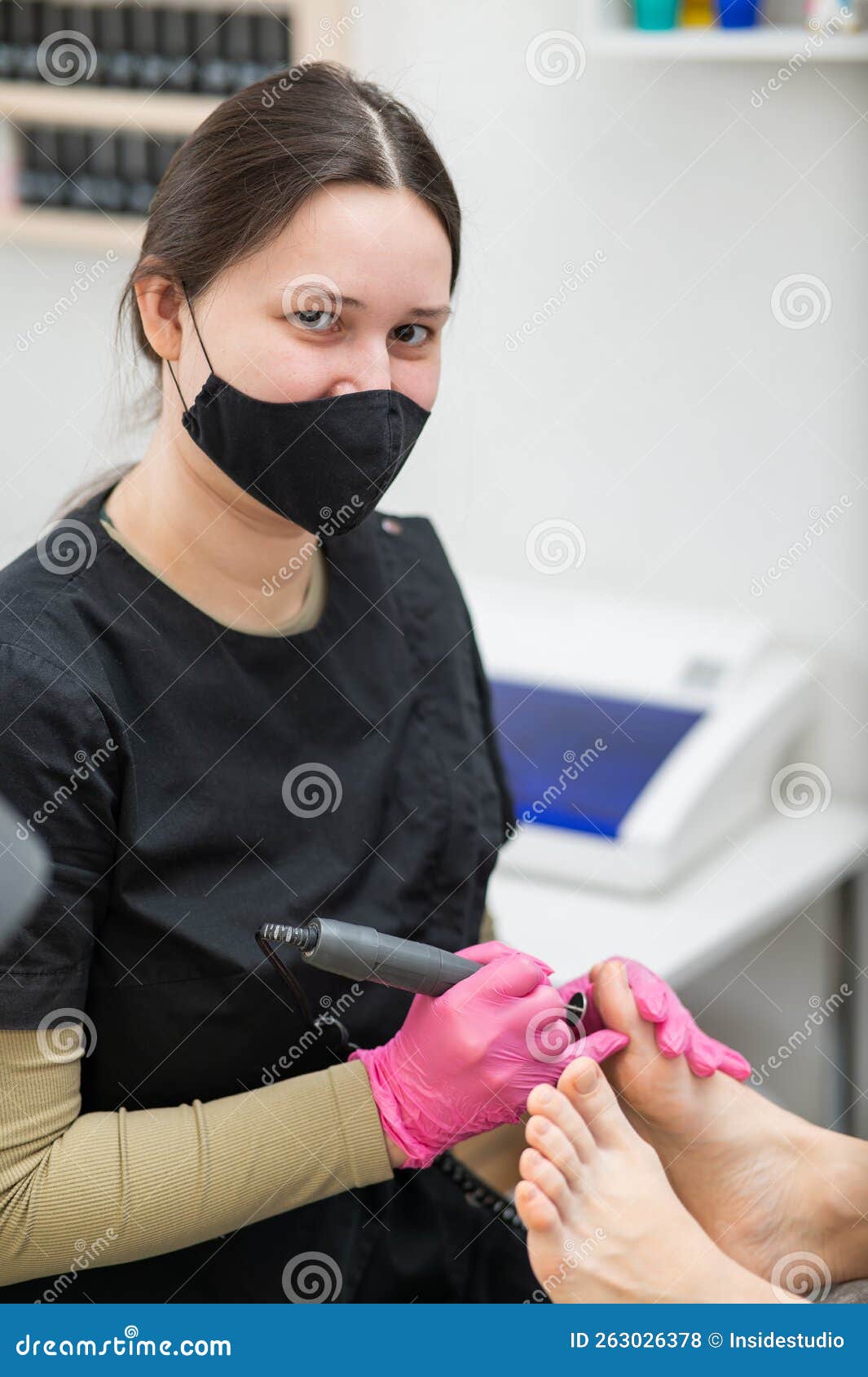 The Pedicure Master Processes the Client S Foot Using an Apparatus with ...